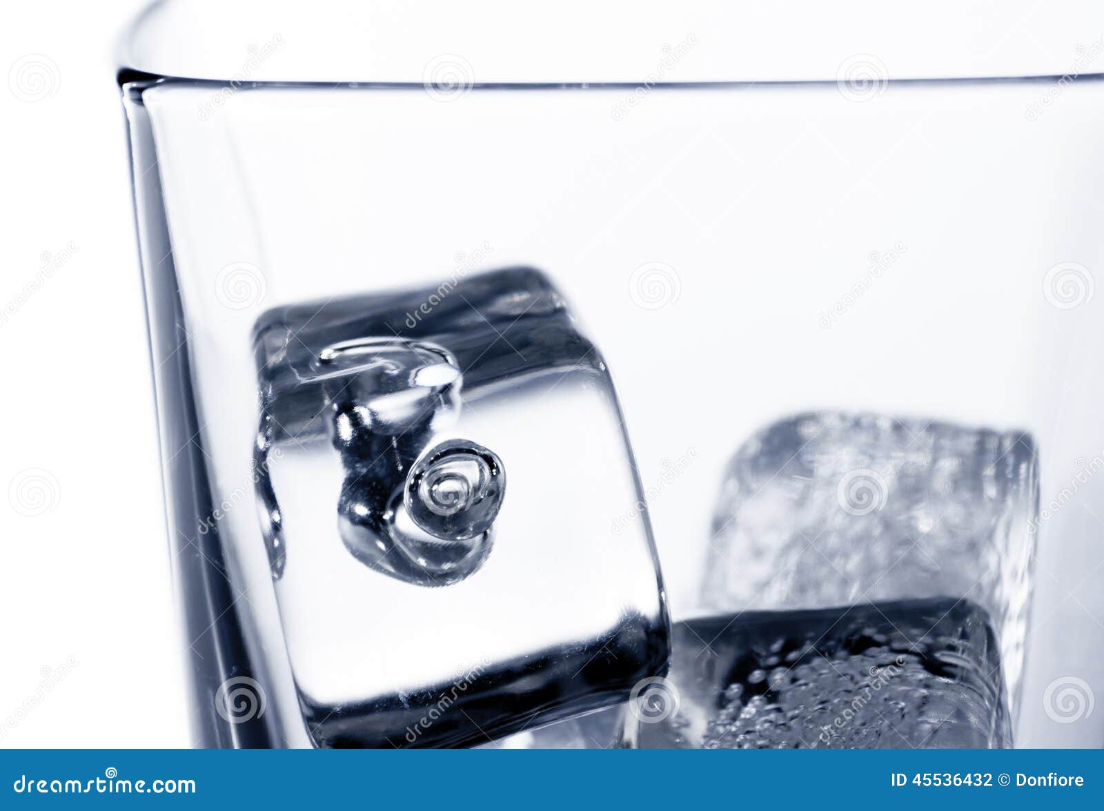 Closeup of Empty Scotch Whiskey in Glass with Ice Cubes on White Stock ...