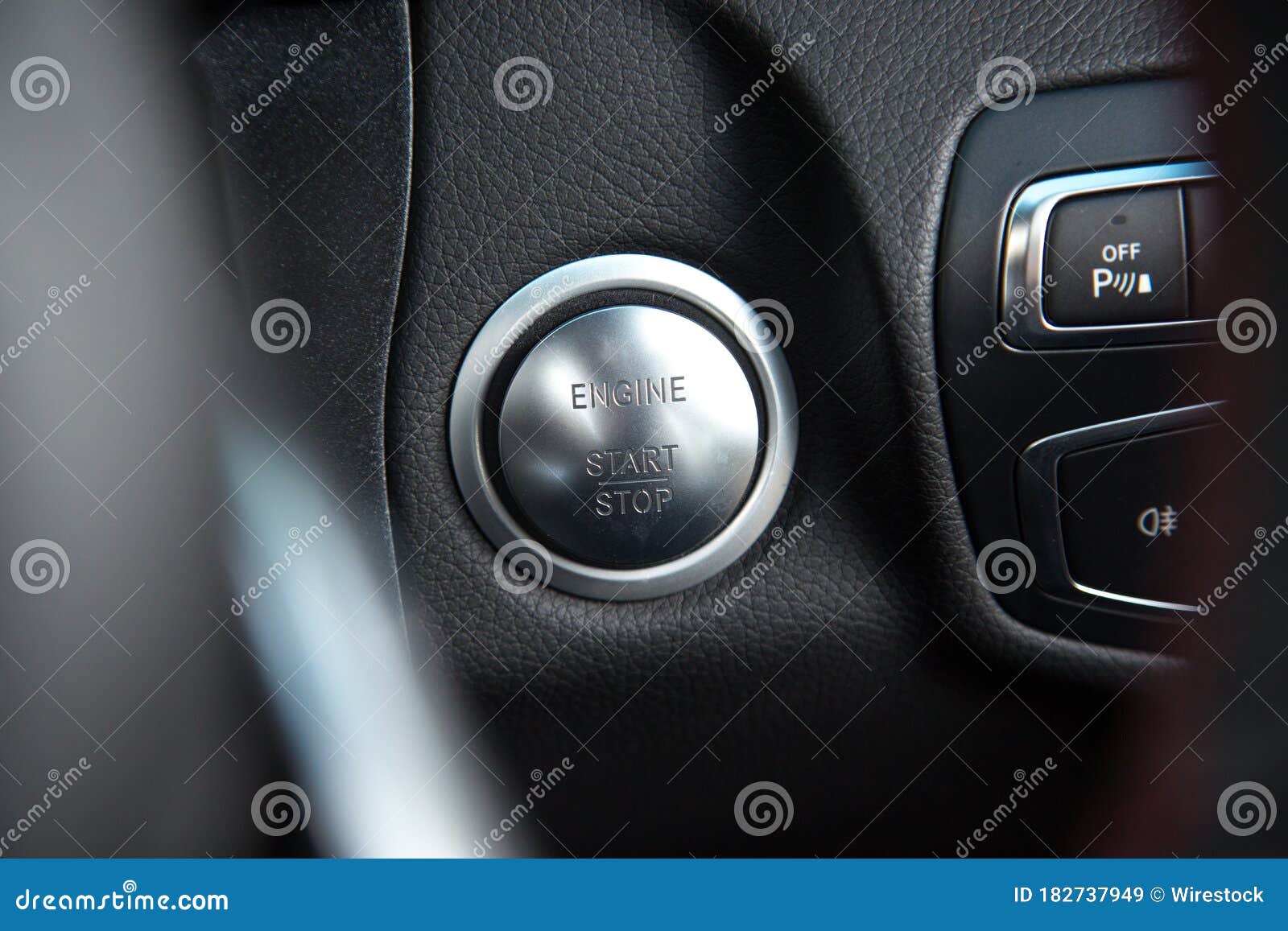 Closeup of a [ENGINE START/STOP] Button of a Black Luxury Car Stock ...