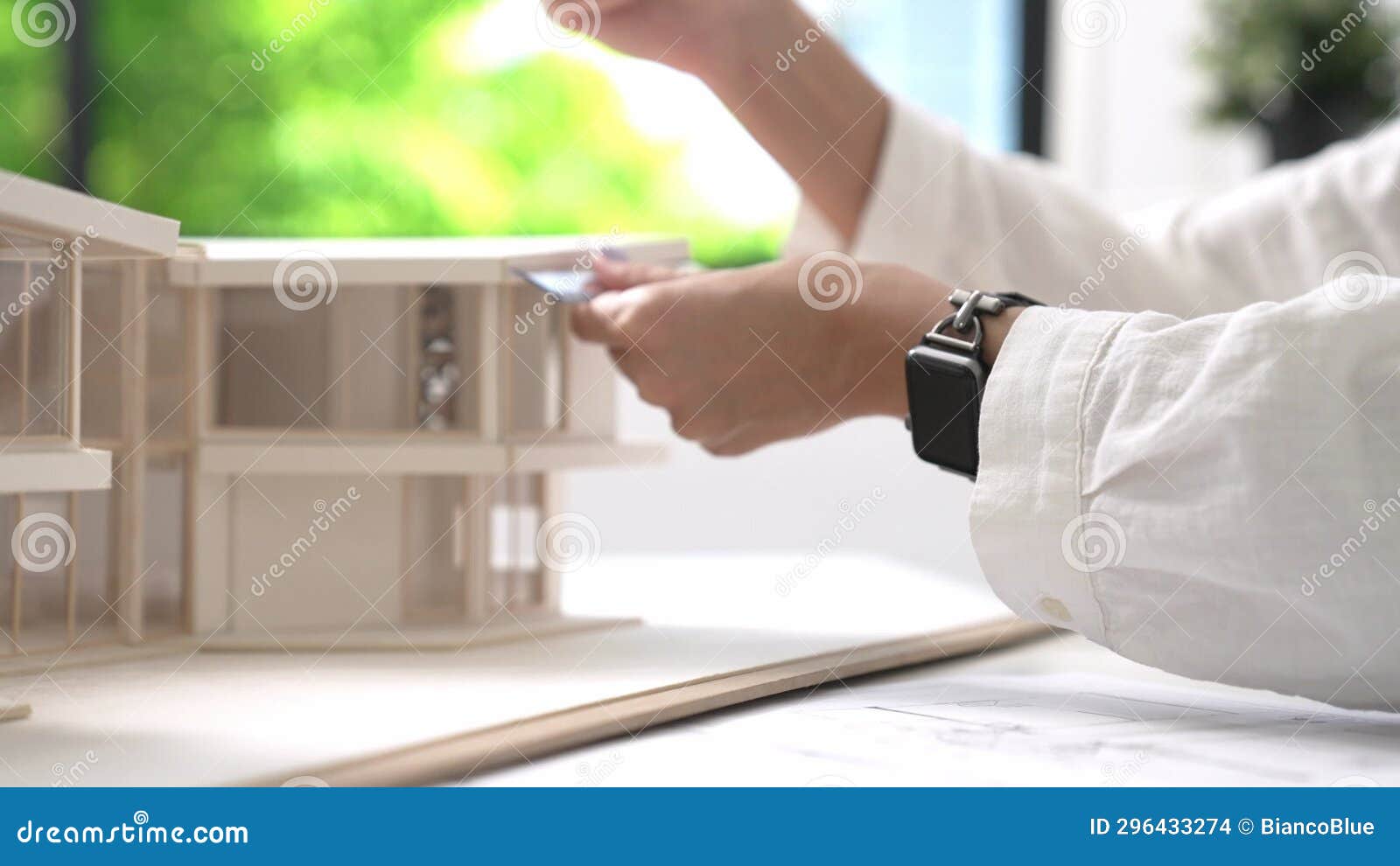 Closeup of Engineer Hand Measure House Model and Write on Blueprint ...