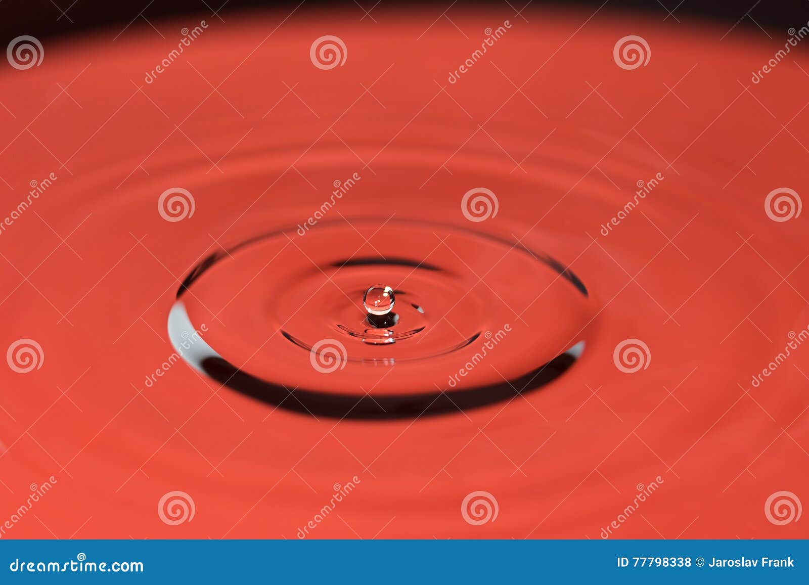 Closeup of Falling Water Drop in Red Stock Photo - Image of liquid ...