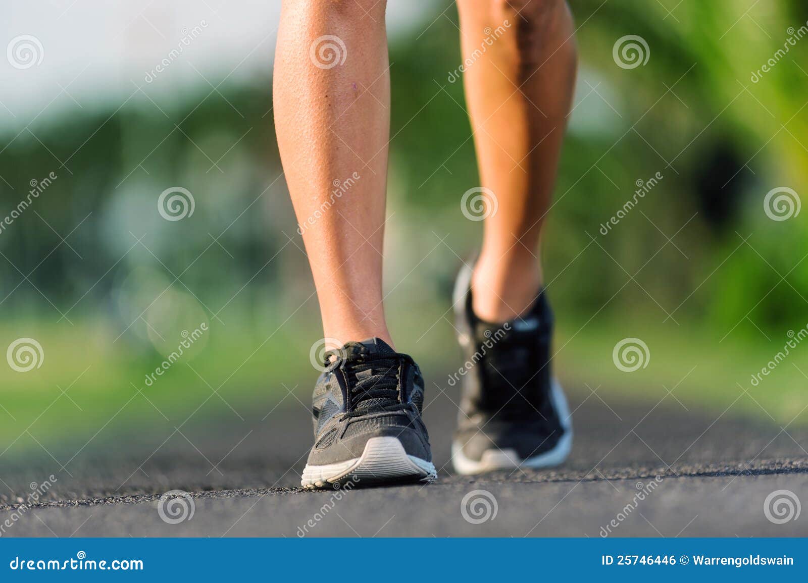 Closeup of feet on pathway stock photo. Image of active - 25746446