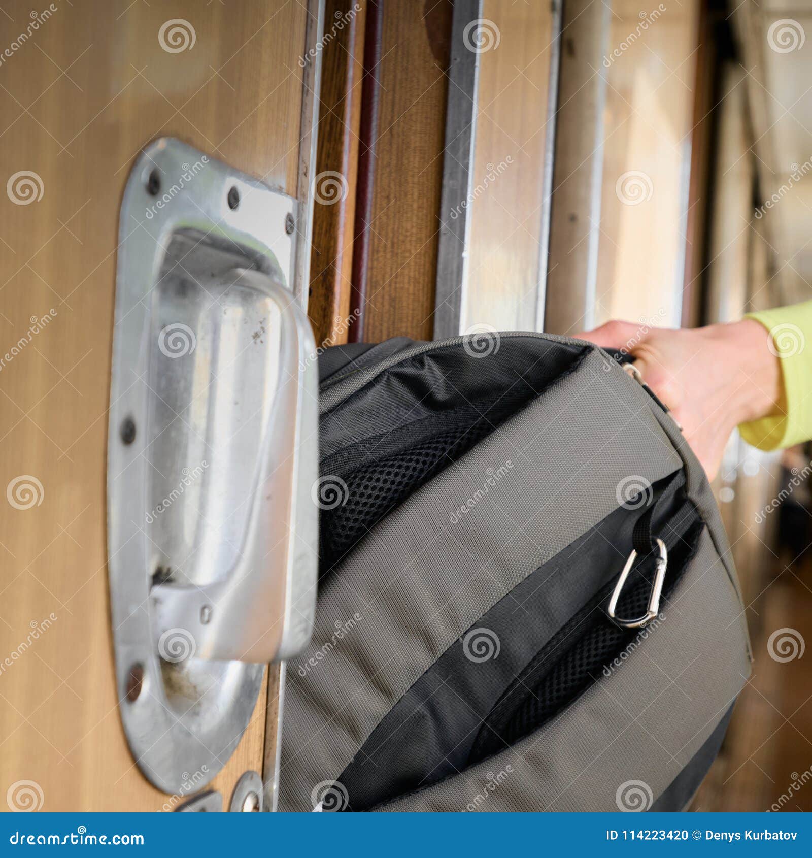 Female hand with backpack stock photo. Image of person - 114223420