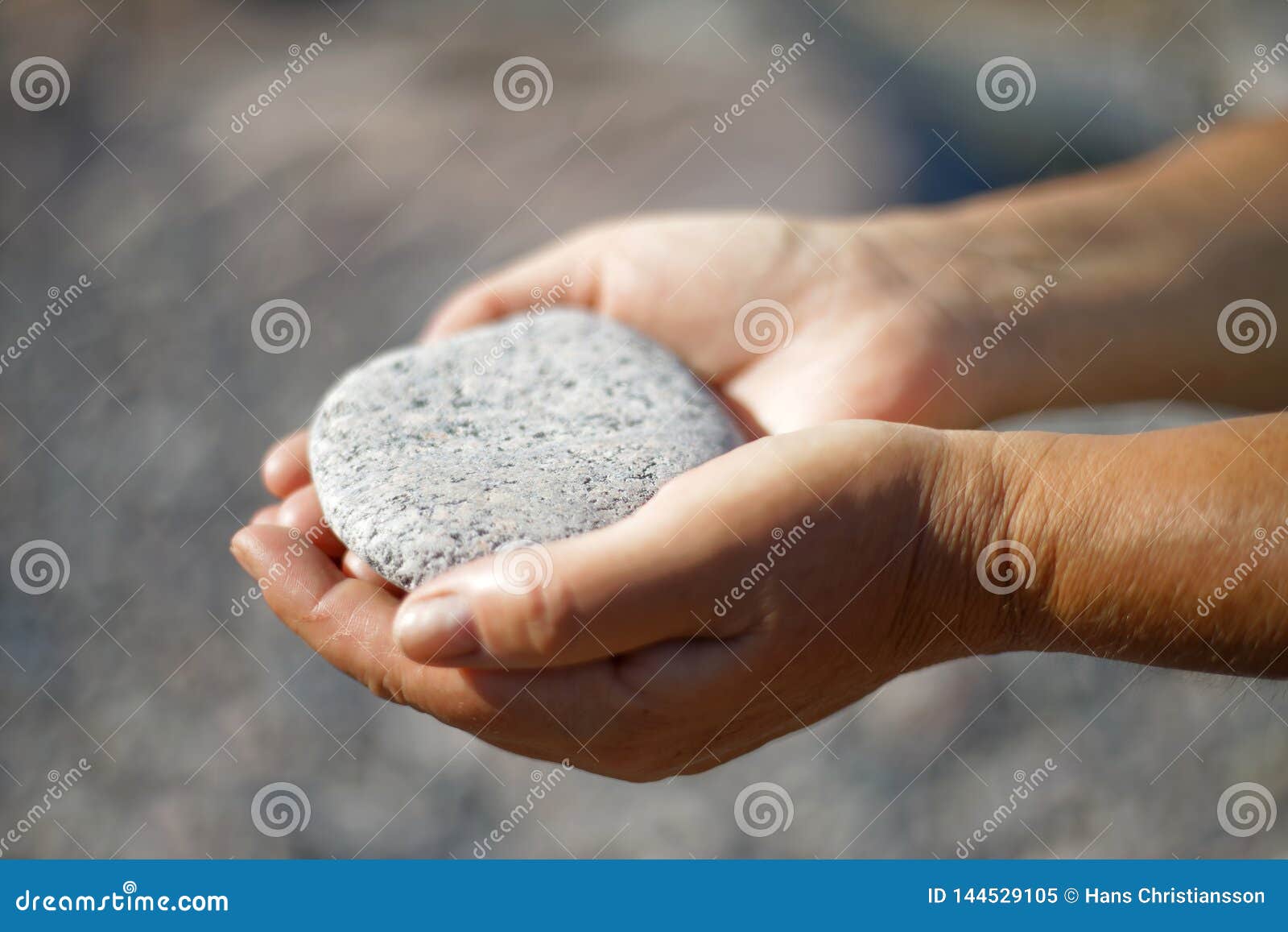 Closeup of Female Hands Holding a Stone in Warm Evening Light Stock ...