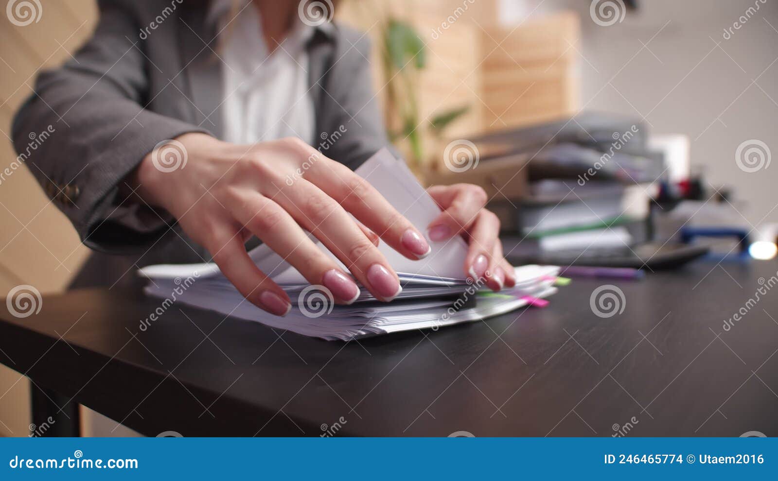 Closeup Female Hands of an Office Worker Sorting through Sheets from ...