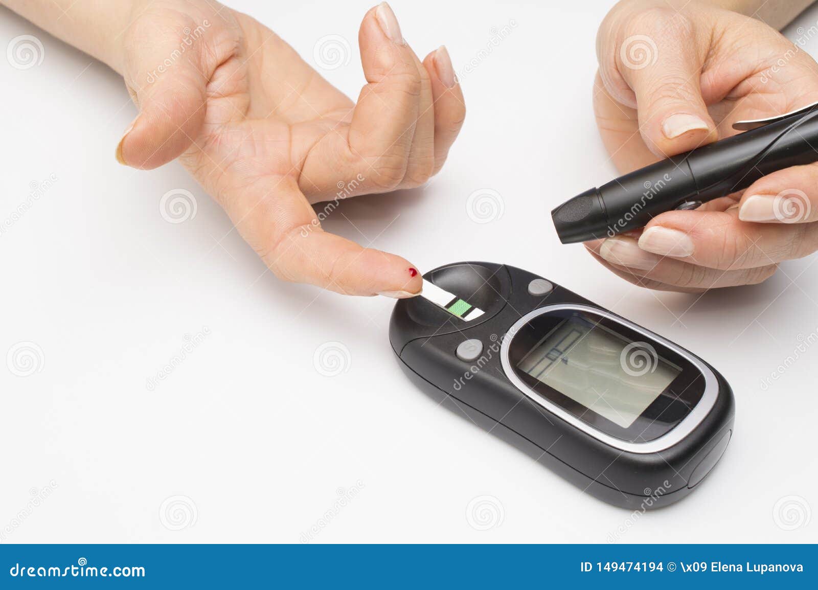 Closeup Female Hands Using Glucometer Scanner on Finger with Blood ...