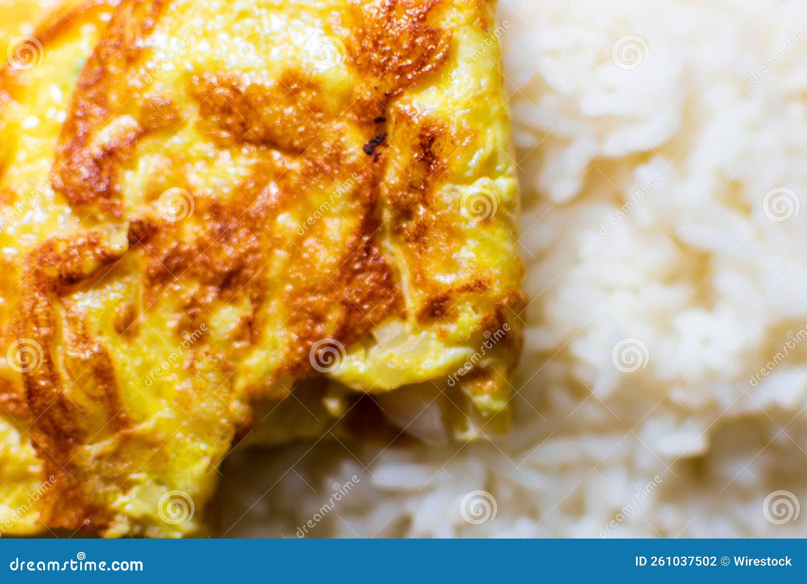 Closeup of a Folded Egg Omelet on Rice for Dinner Meal Stock Photo ...