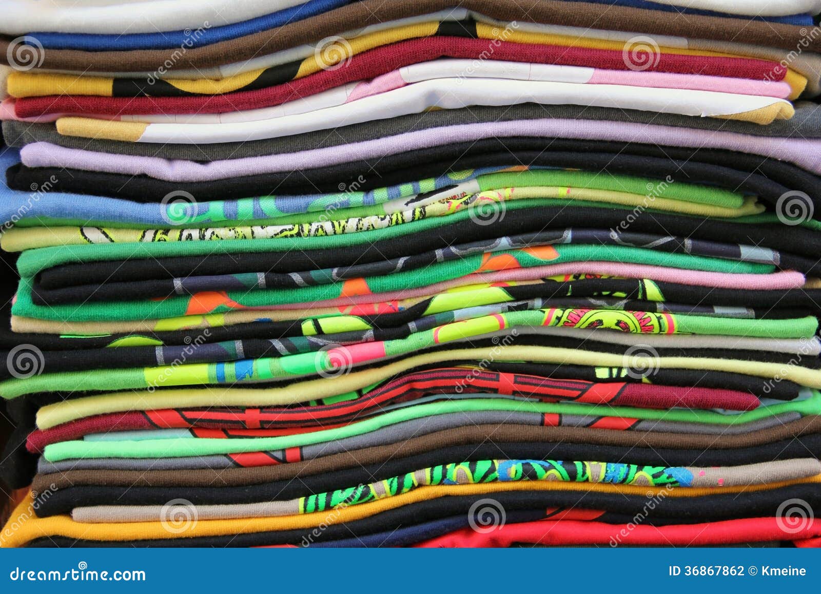 Closeup of Folded Stack of T-Shirts Stock Photo - Image of colorful ...