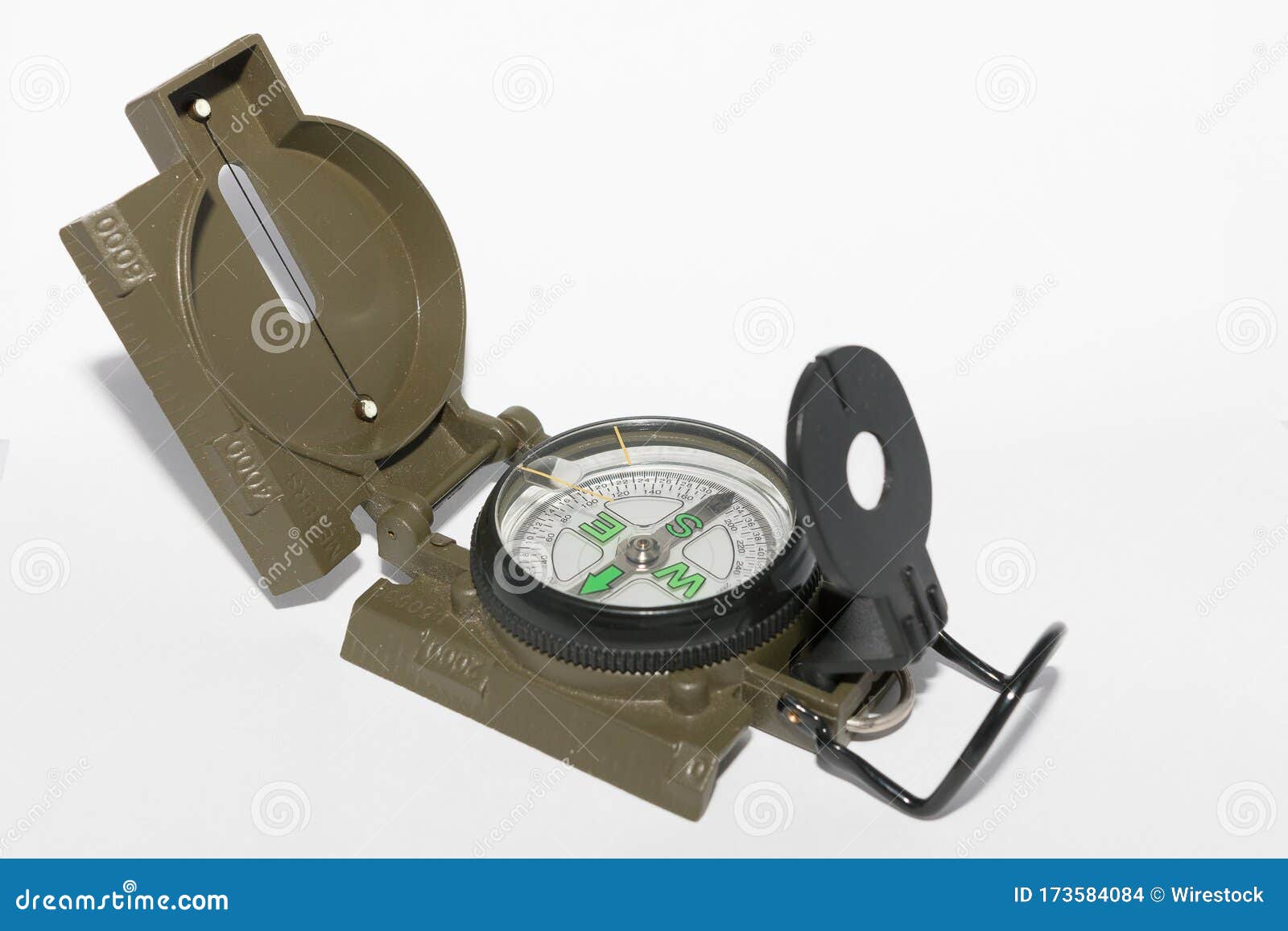 Closeup of a Folding Compass Under the Lights Against a White ...