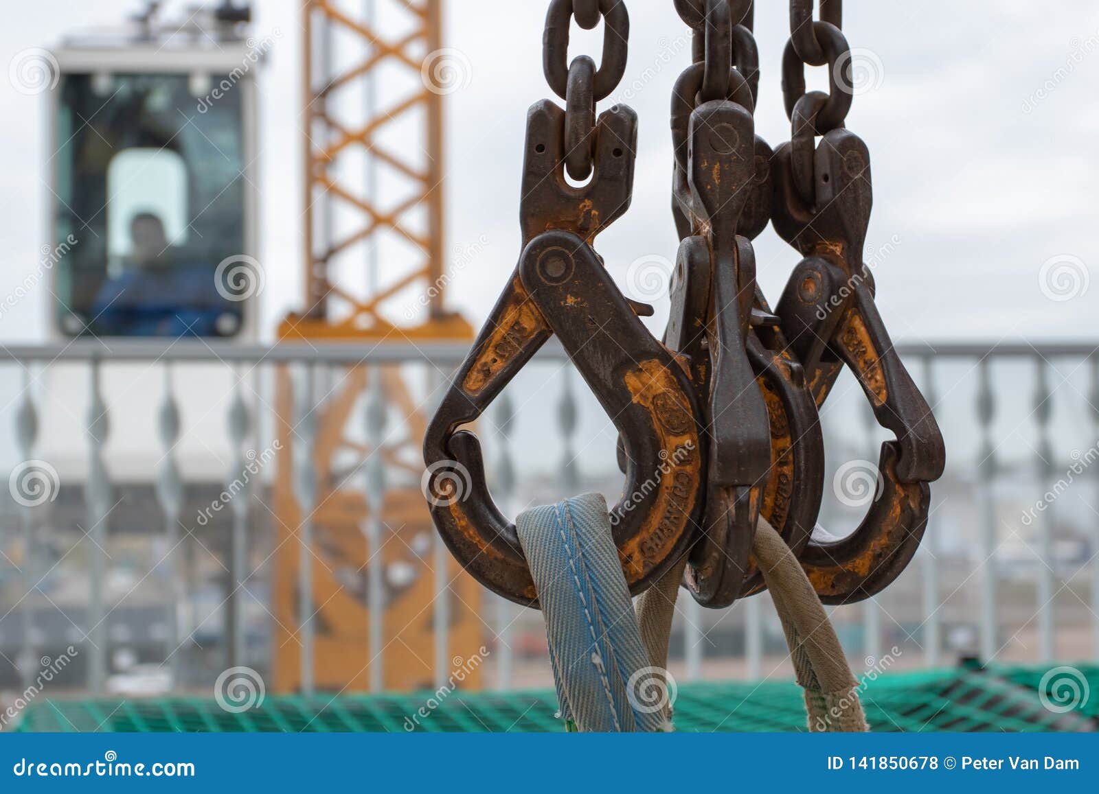 Closeup Of Four Crane Hooks With Straps Attached Stock Photo - Image of ...