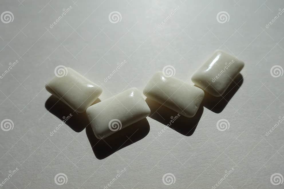 Closeup of Four White Pieces of Chewing Gum Stock Photo - Image of ...