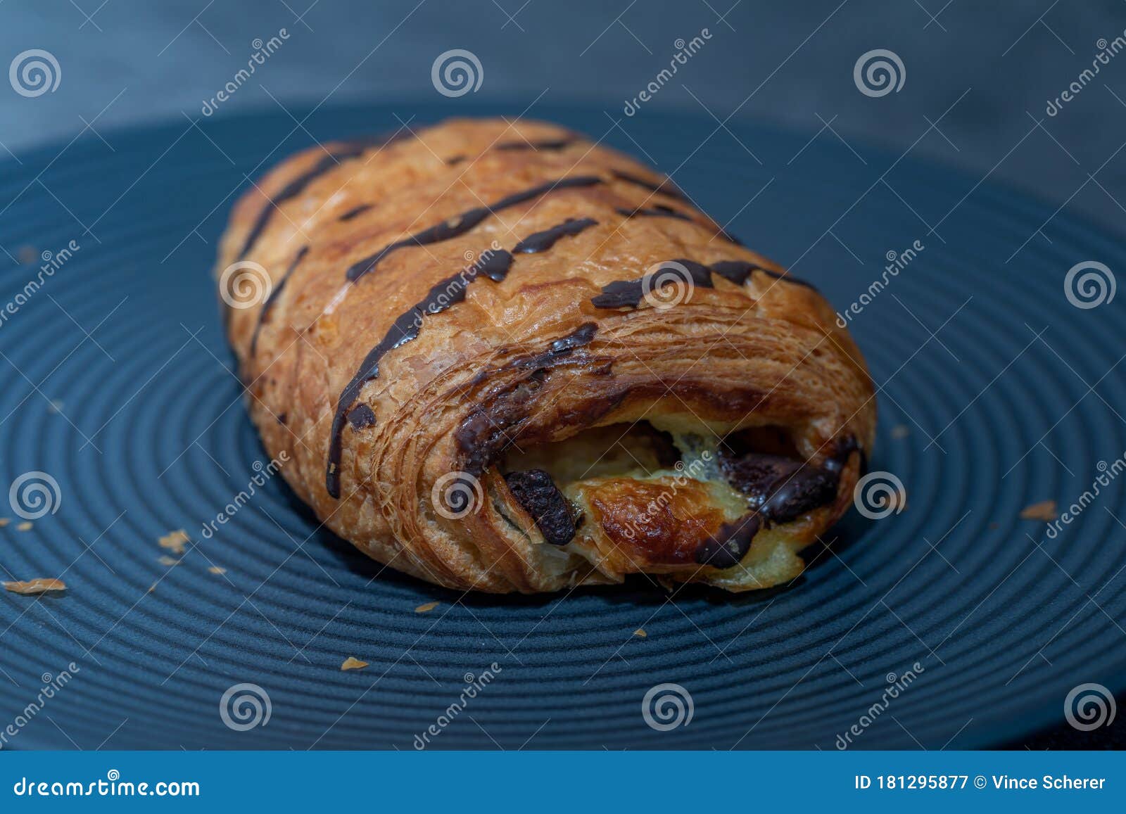 Closeup of French Chocolatine on Table on a Black Plate Stock Image ...