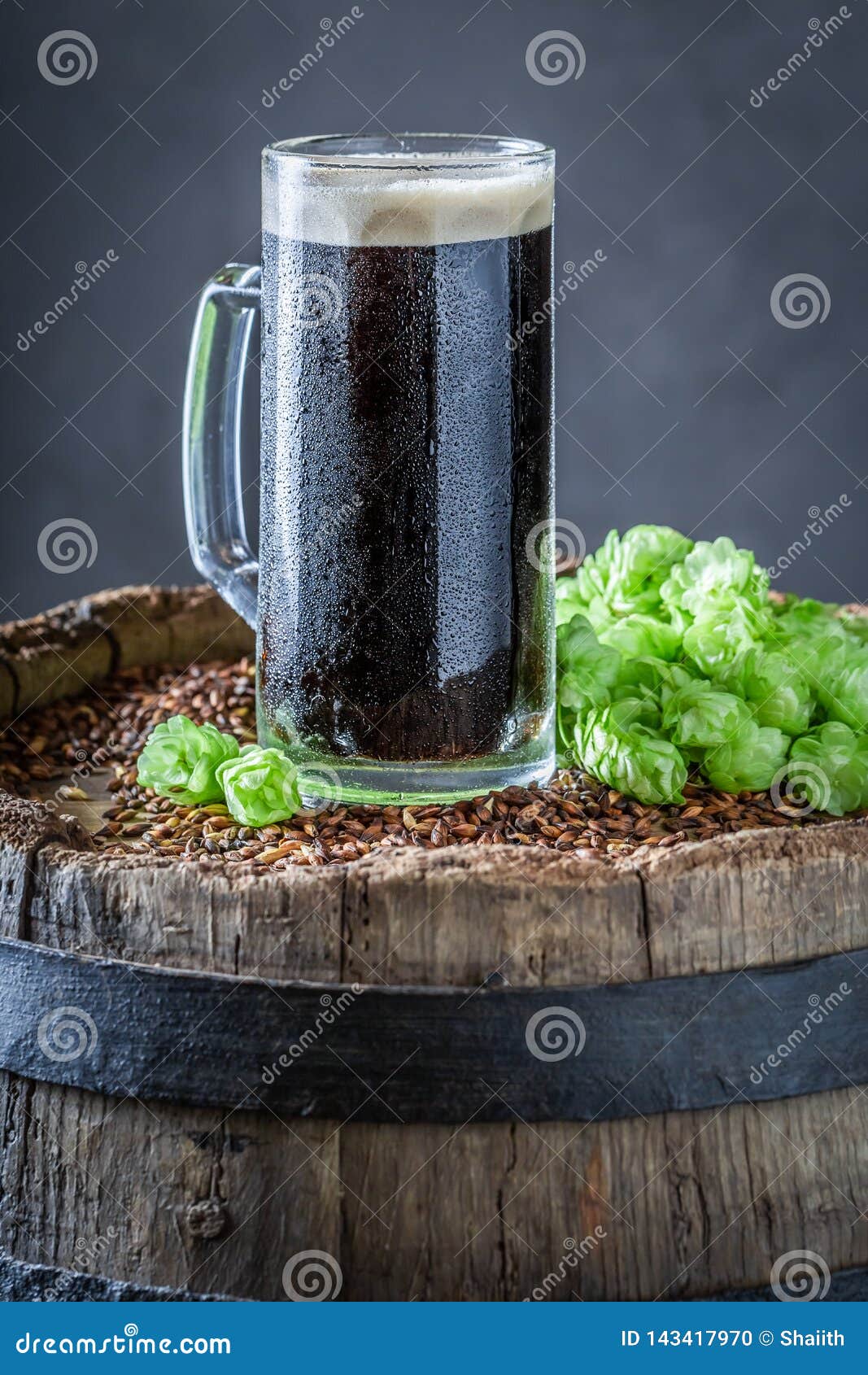 Closeup of Fresh Dark Beer with Wheat and Hops Stock Photo - Image of ...