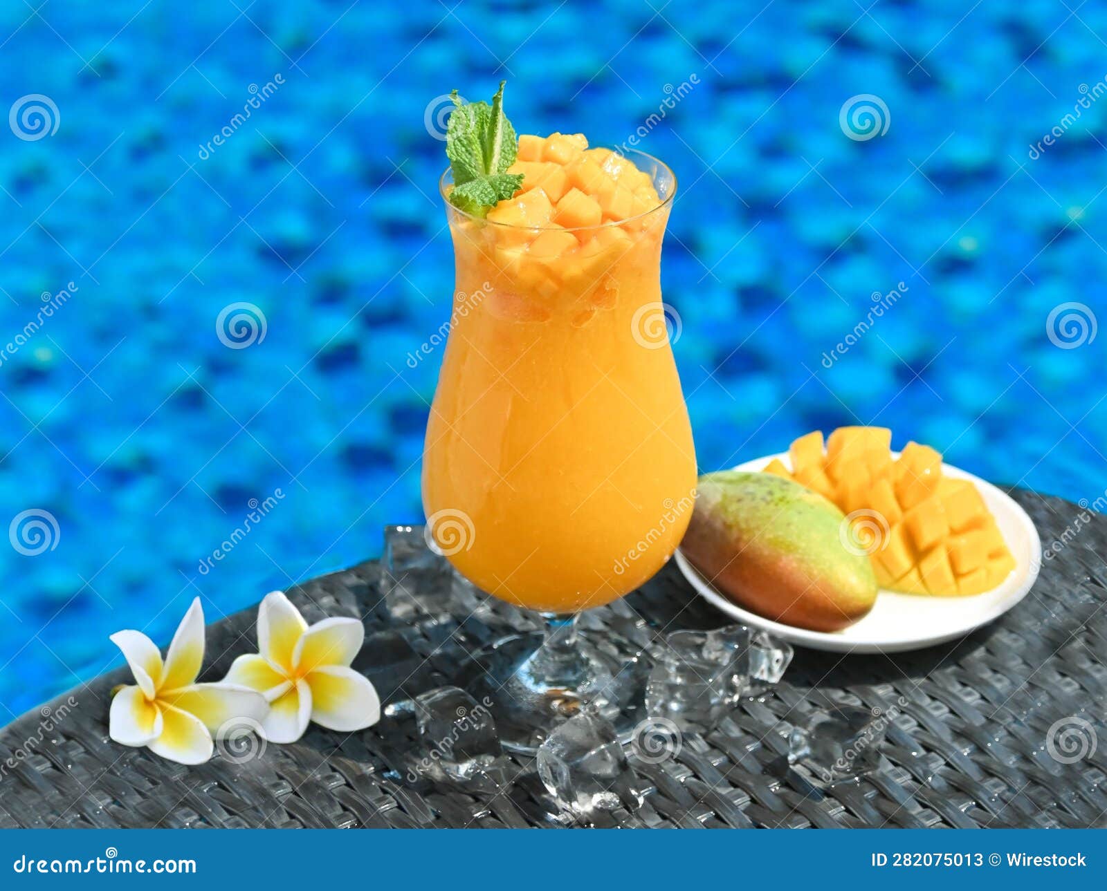 Closeup of a Fresh Mango Cocktail on the Side of the Pool Stock Image ...