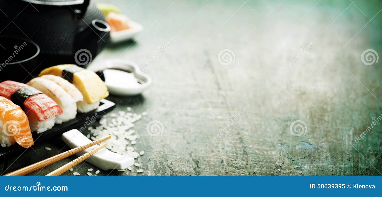 Fresh Sushi Rolls With Various Ingredients Falling On A Black Clay ...