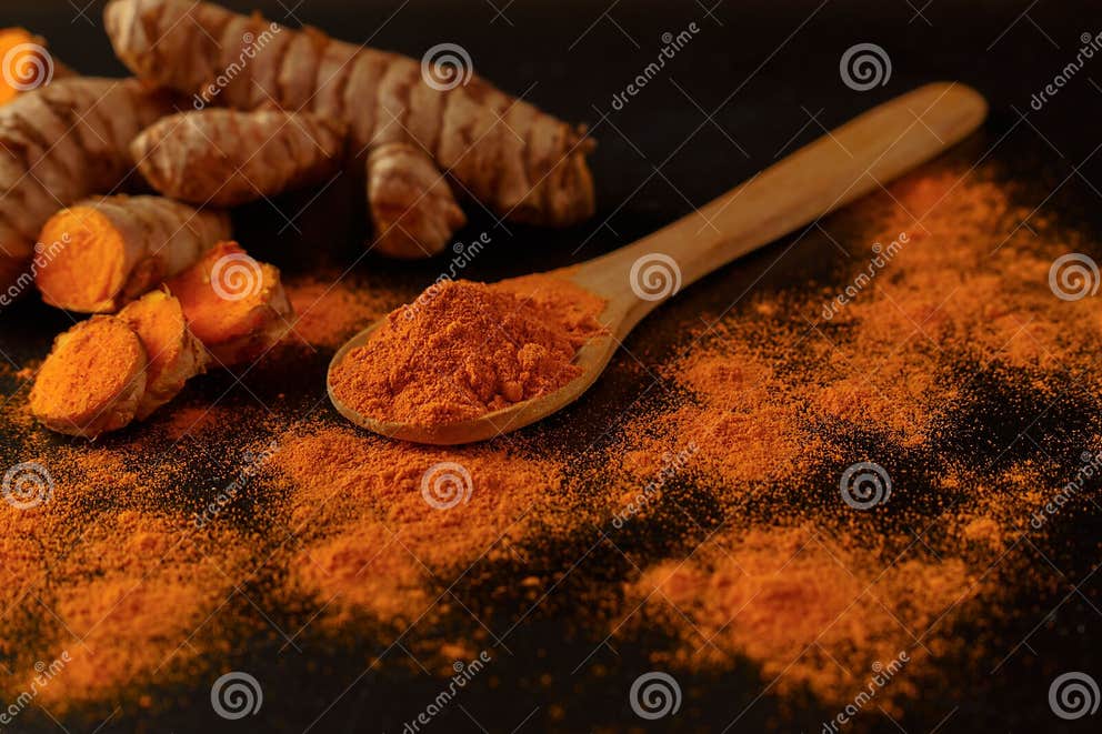 Closeup of Fresh Turmeric Root and Ground Turmeric Stock Photo - Image ...