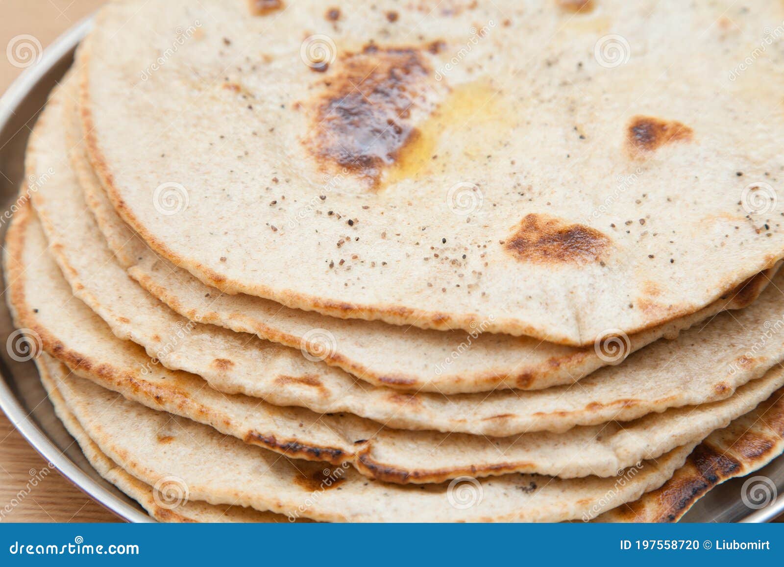 Whole wheat flatbread stock photo. Image of cooking - 197558720
