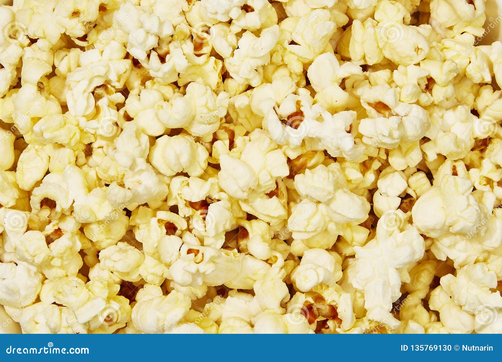 Closeup of Fresh Yellow Butter Popcorn Stock Photo - Image of square ...