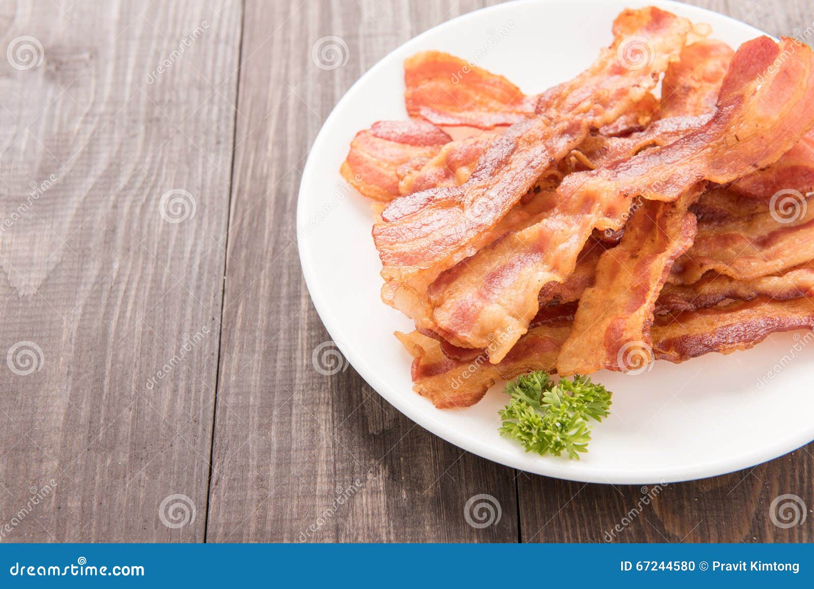 Closeup of Fried Bacon Strips on White Plate Stock Photo - Image of ...