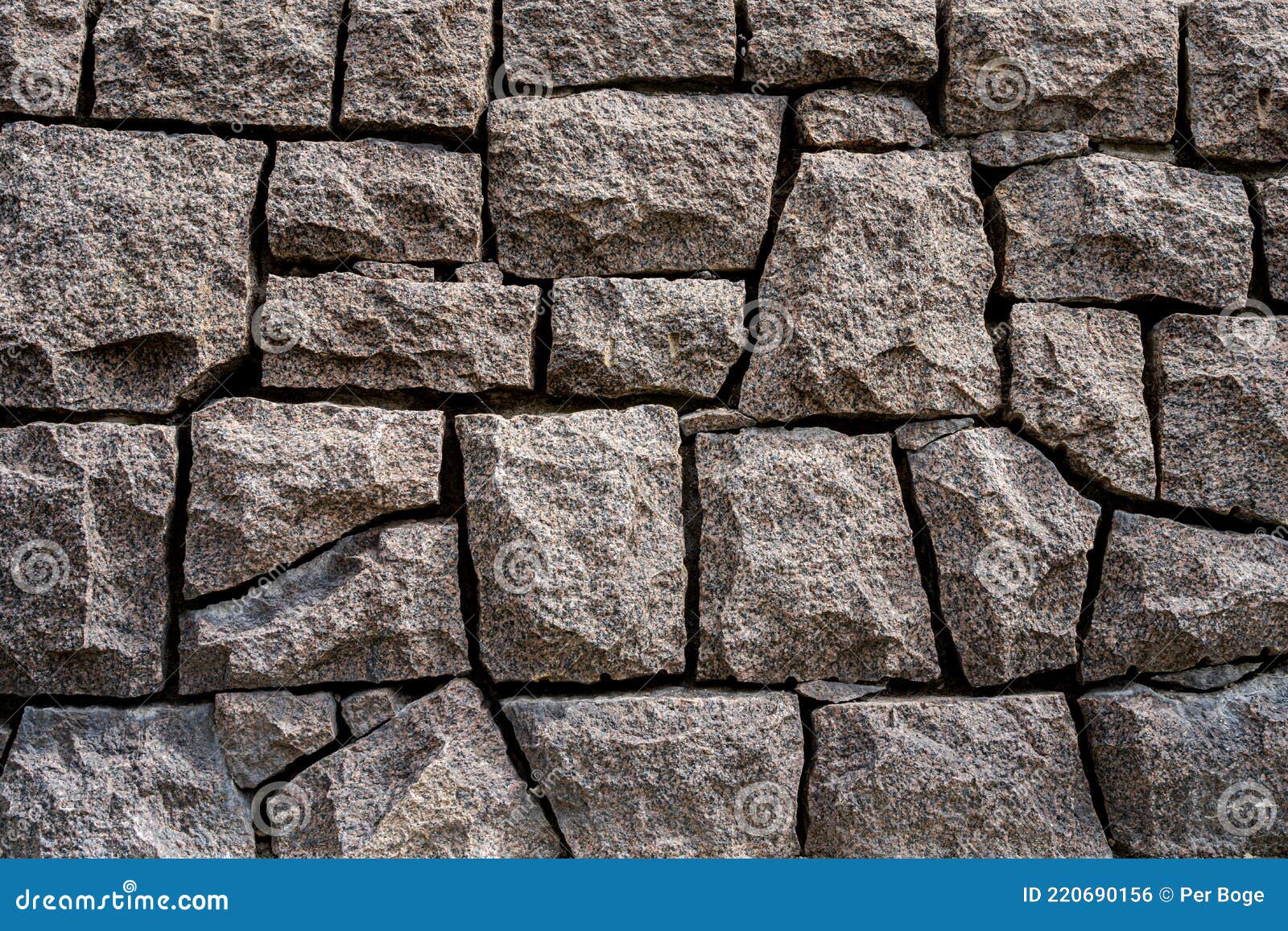 Closeup Front View of a Massive Stone Wall with Sharp Lines Outdoors ...
