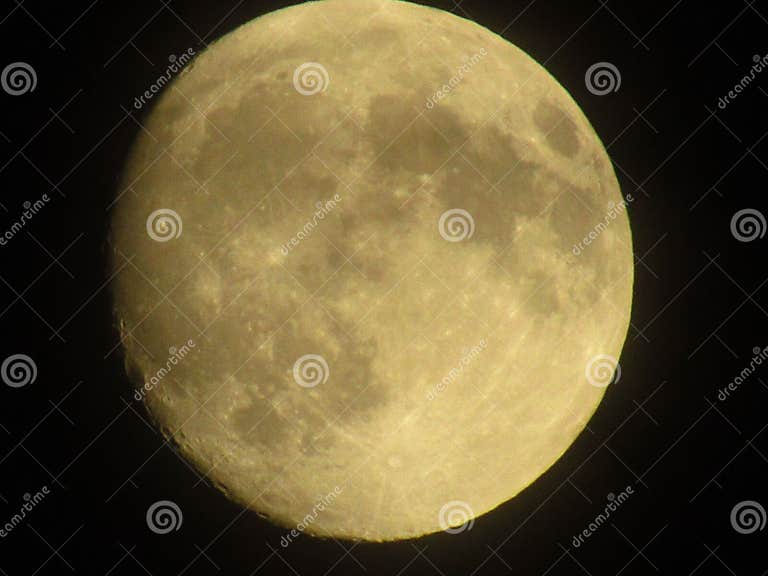 Closeup of a Full Moon Surface Against a Black Background Stock Image ...