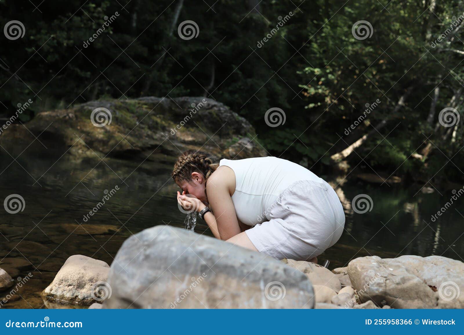 Closeup of a Girl Washing Her Face in a River Stock Photo - Image of ...