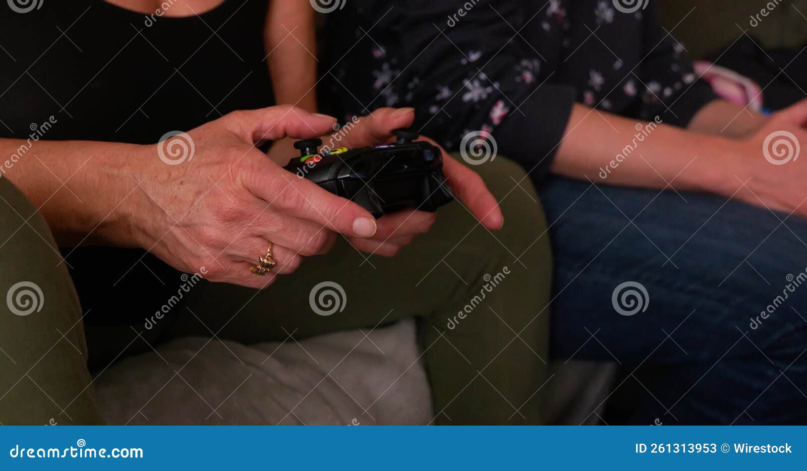 Closeup of Girls Playing Video Games with Xbox One Controller on the ...