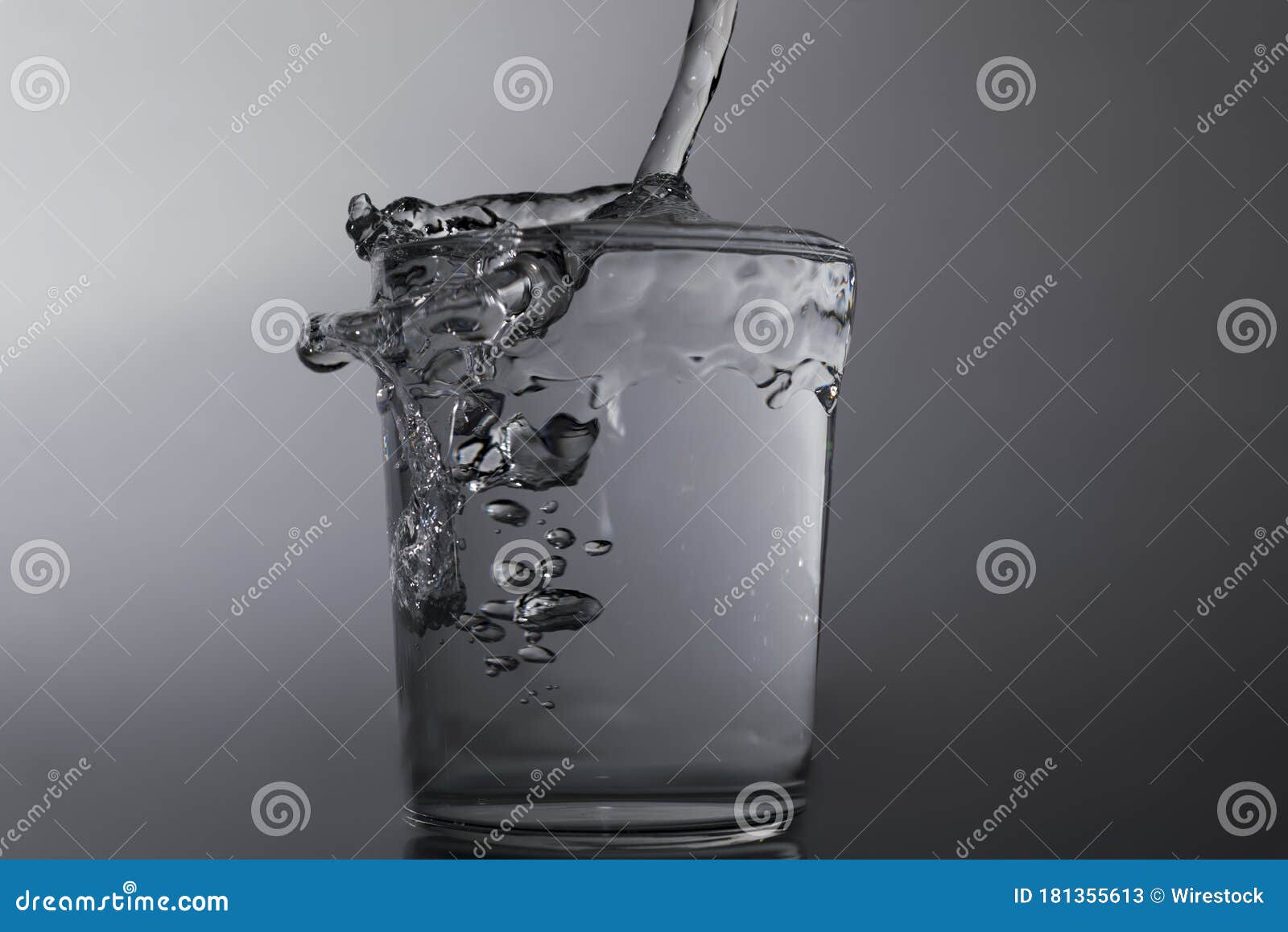 Overflowing Cup Of Water Stock Photography | CartoonDealer.com #14160716
