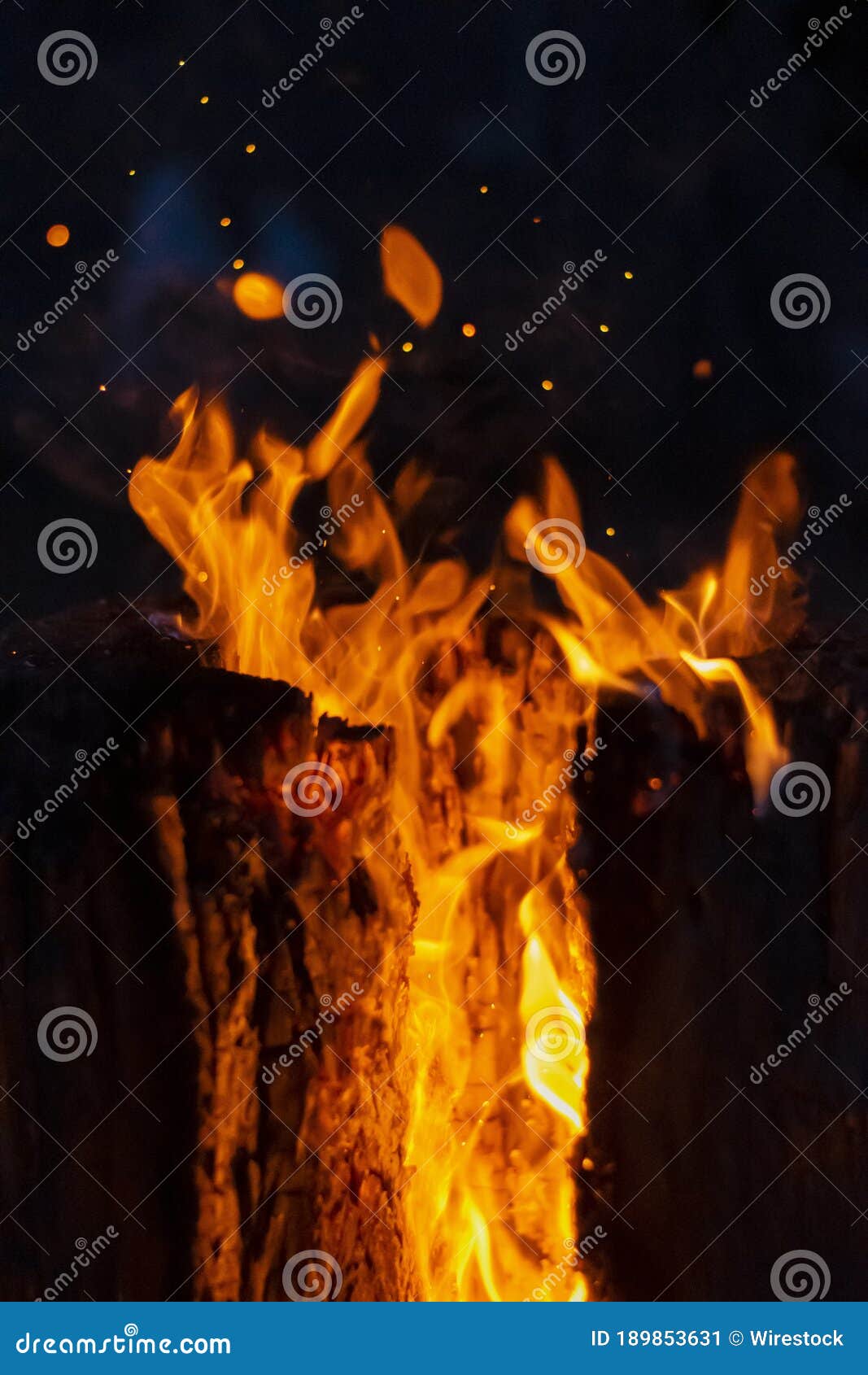 Closeup of Glowing Log Embers and Flames Creating a Fiery Abstract ...