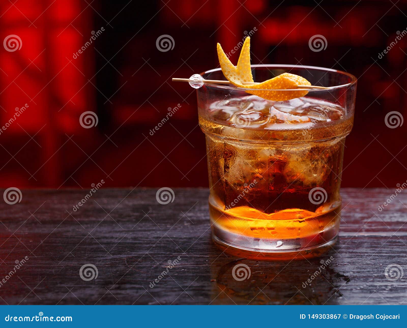Closeup Of A God Father Cocktail In Short Glass Gin Standing On The Bar Counter Isolated On A