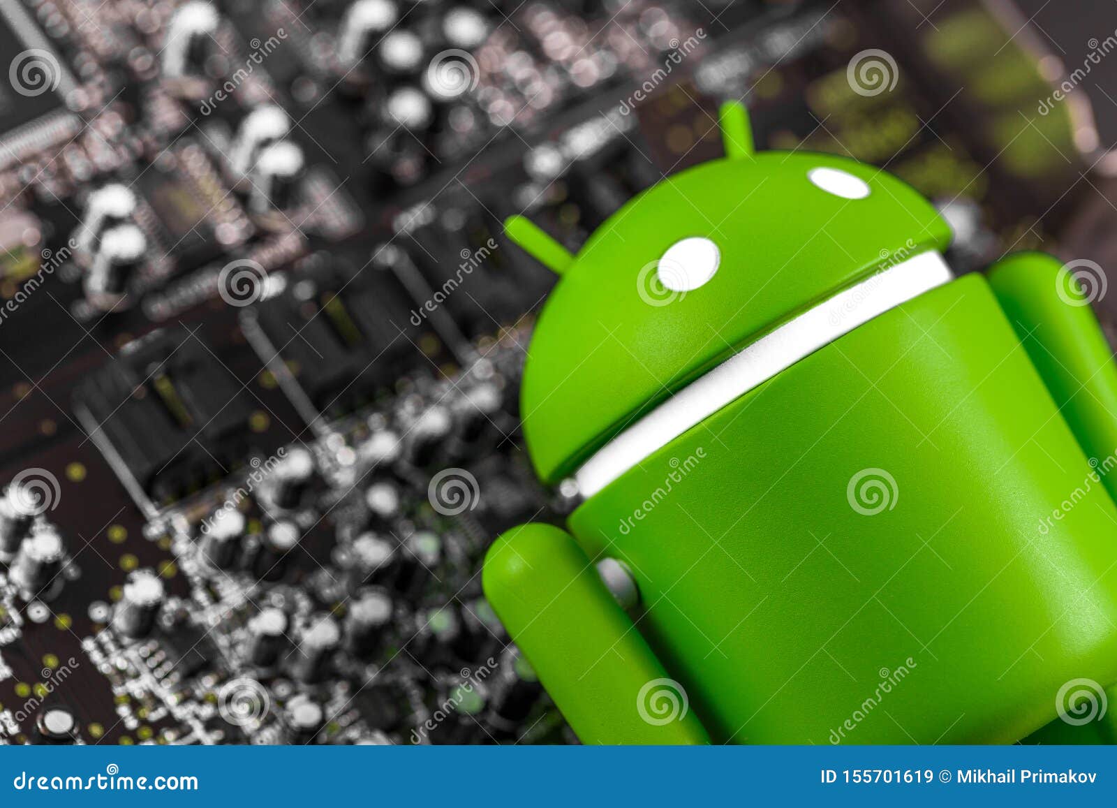 Google Android Figure and Circuit Board. Google Android is the ...
