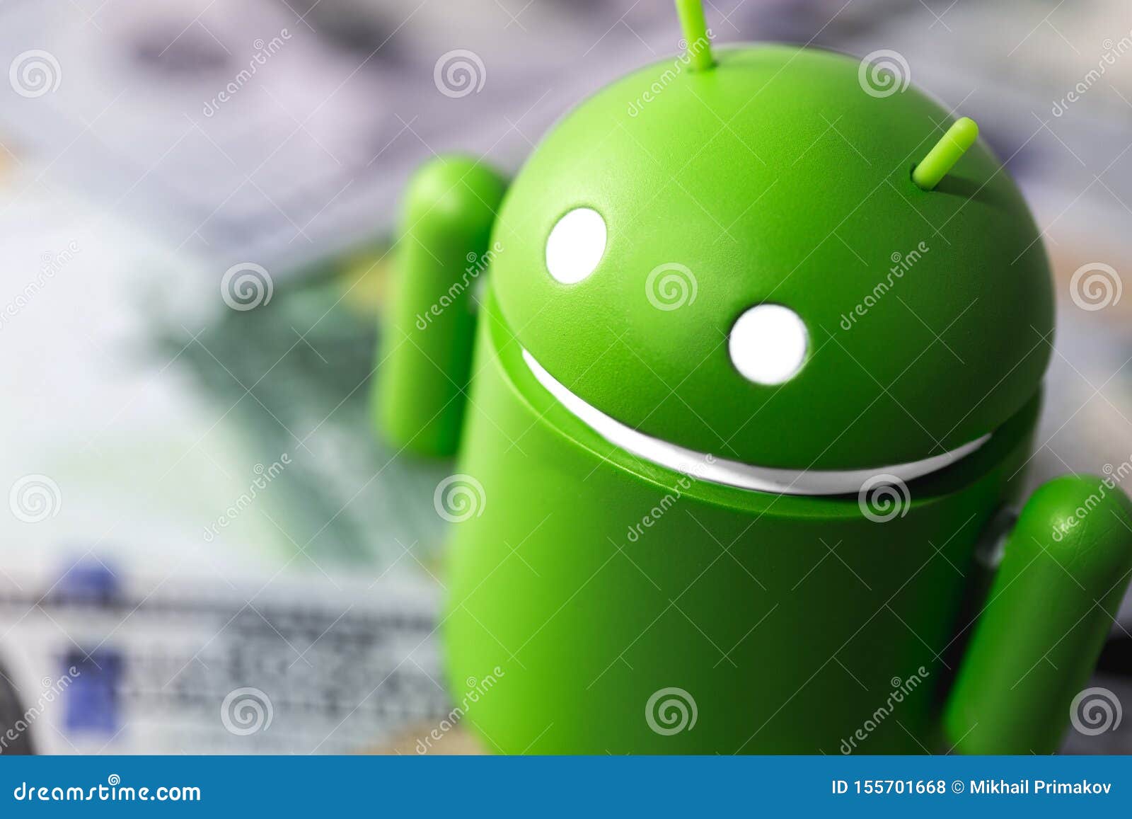 Google Android Figure Standing on Money Editorial Stock Photo - Image ...