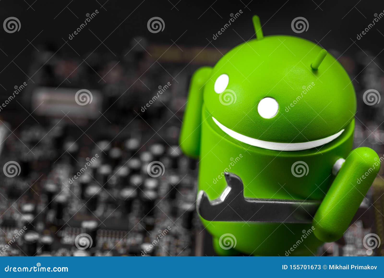 Google Android Figure with Wrench on the Circuit Board. Editorial Stock ...