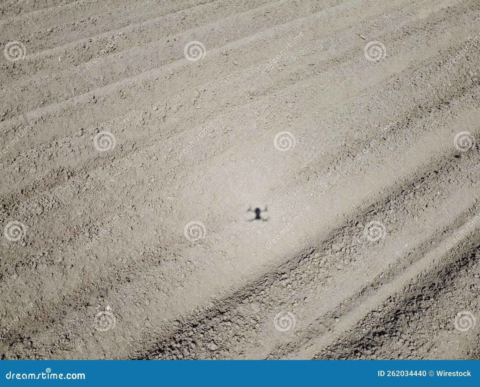 Closeup of Ground with a Drone Shadow Stock Photo - Image of ground ...