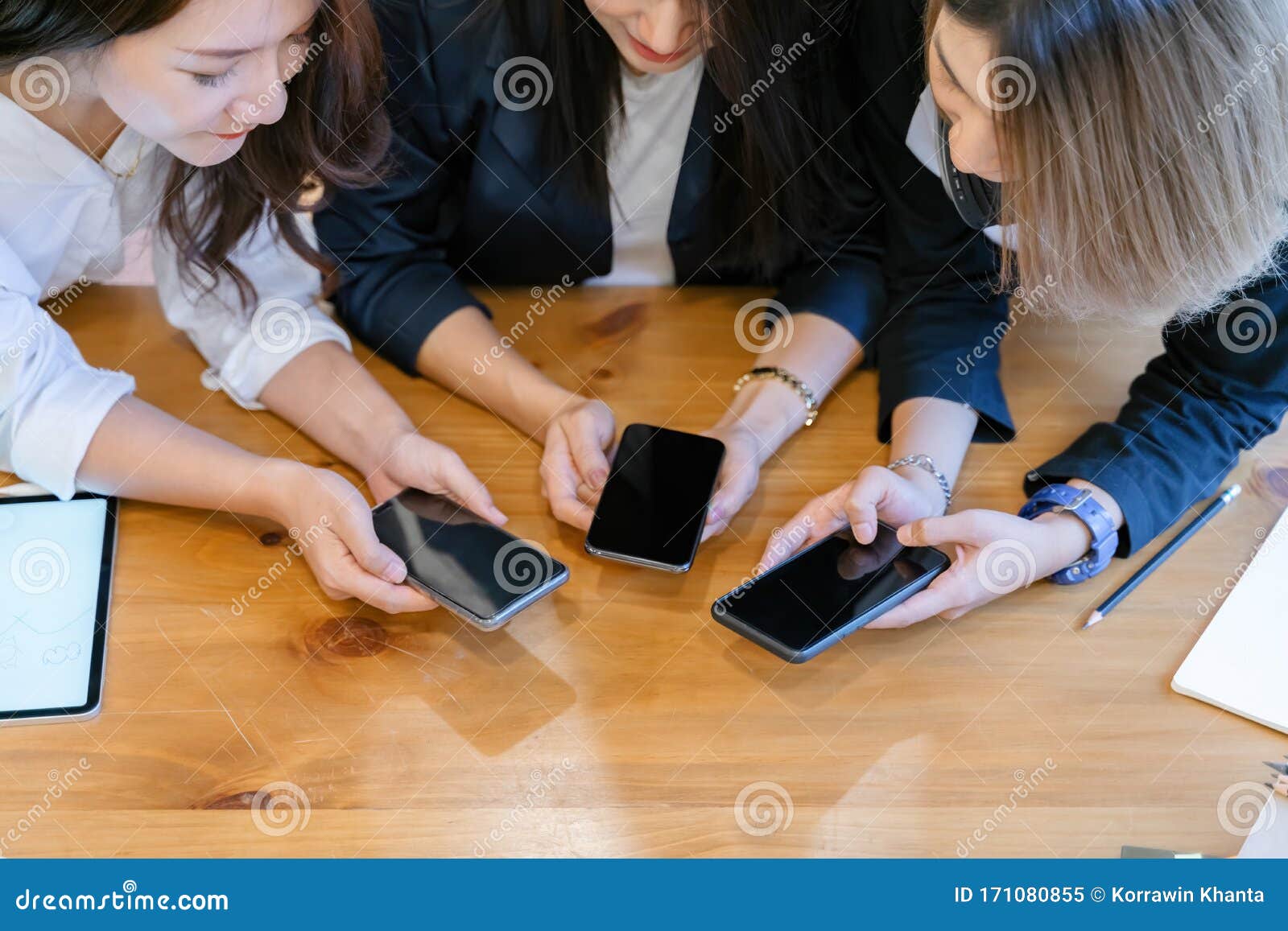 Closeup Group of Asian Students Hands Sharing Content on Social Media ...