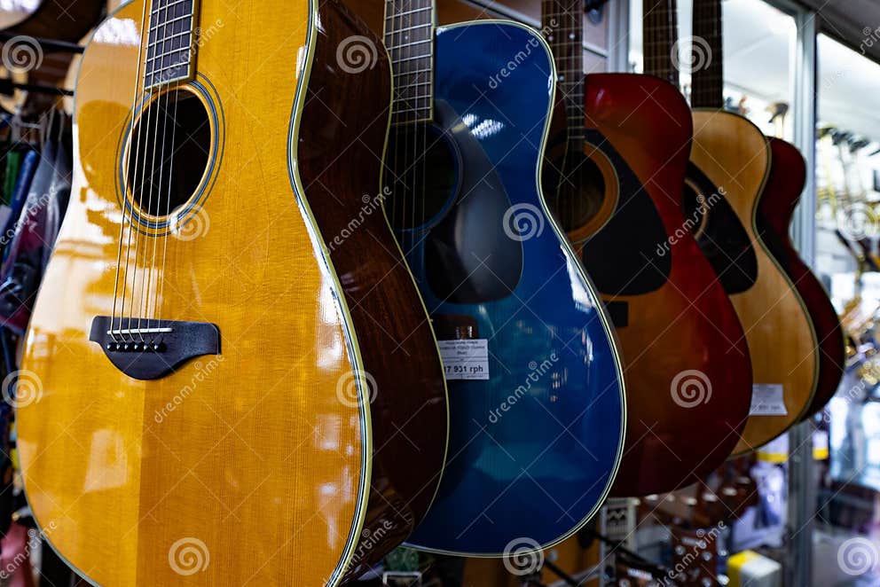Closeup of Guitars in Store Editorial Stock Image - Image of purchase ...
