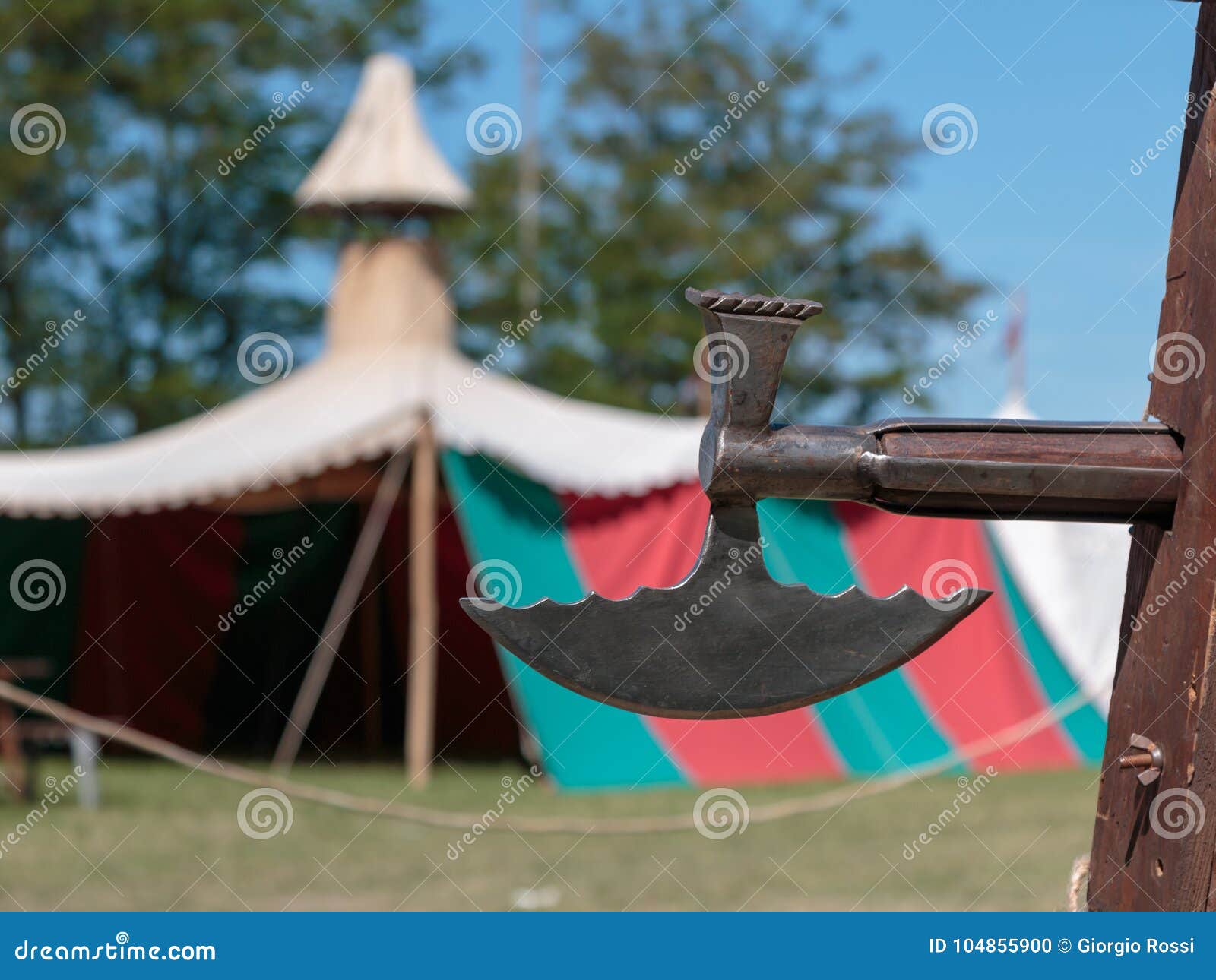 Closeup of Halberd, Medieval Pole Weapon and Tent in Background Stock ...