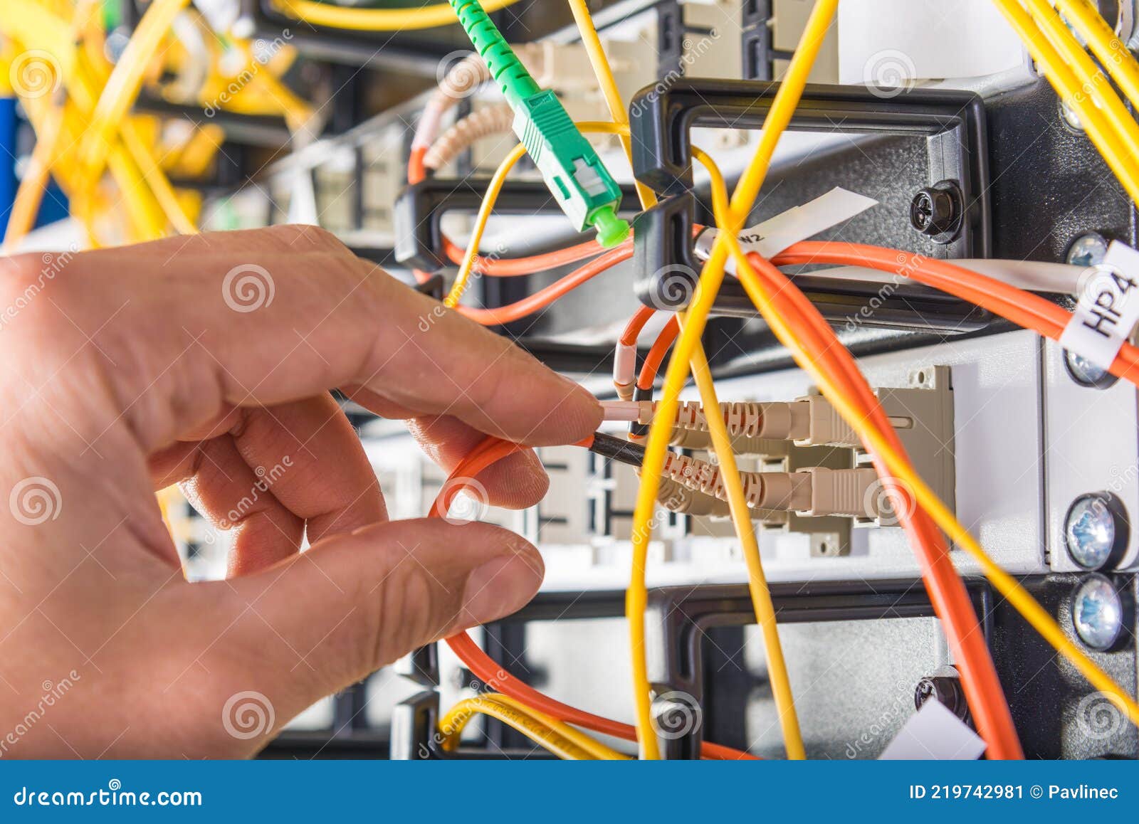 Hand of Engineer Plugging in Ethernet Cable into Server Switch P Stock ...