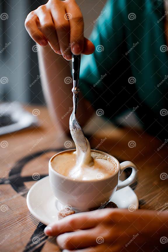 Closeup of Hand with Coffee Cup in a Cafe Stock Photo - Image of ...