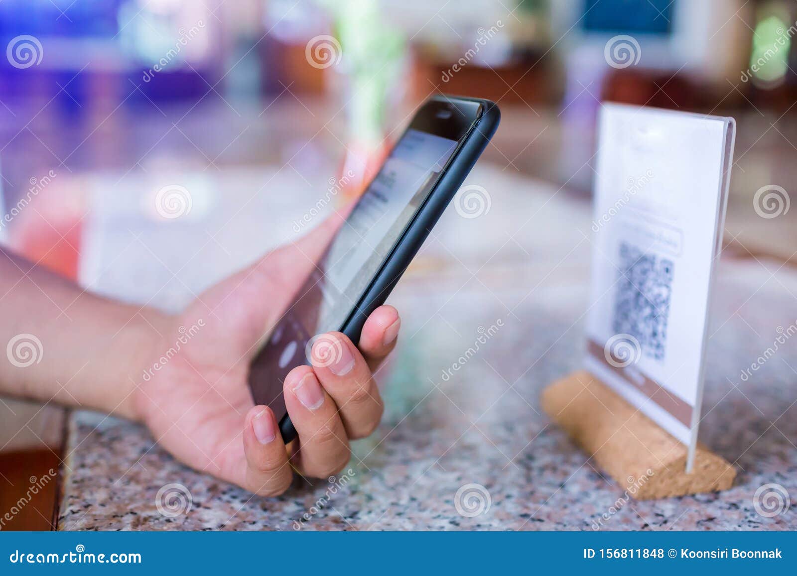 Closeup of a Hand Holding Phone and Scanning Qr Code. Man Hand Paying ...