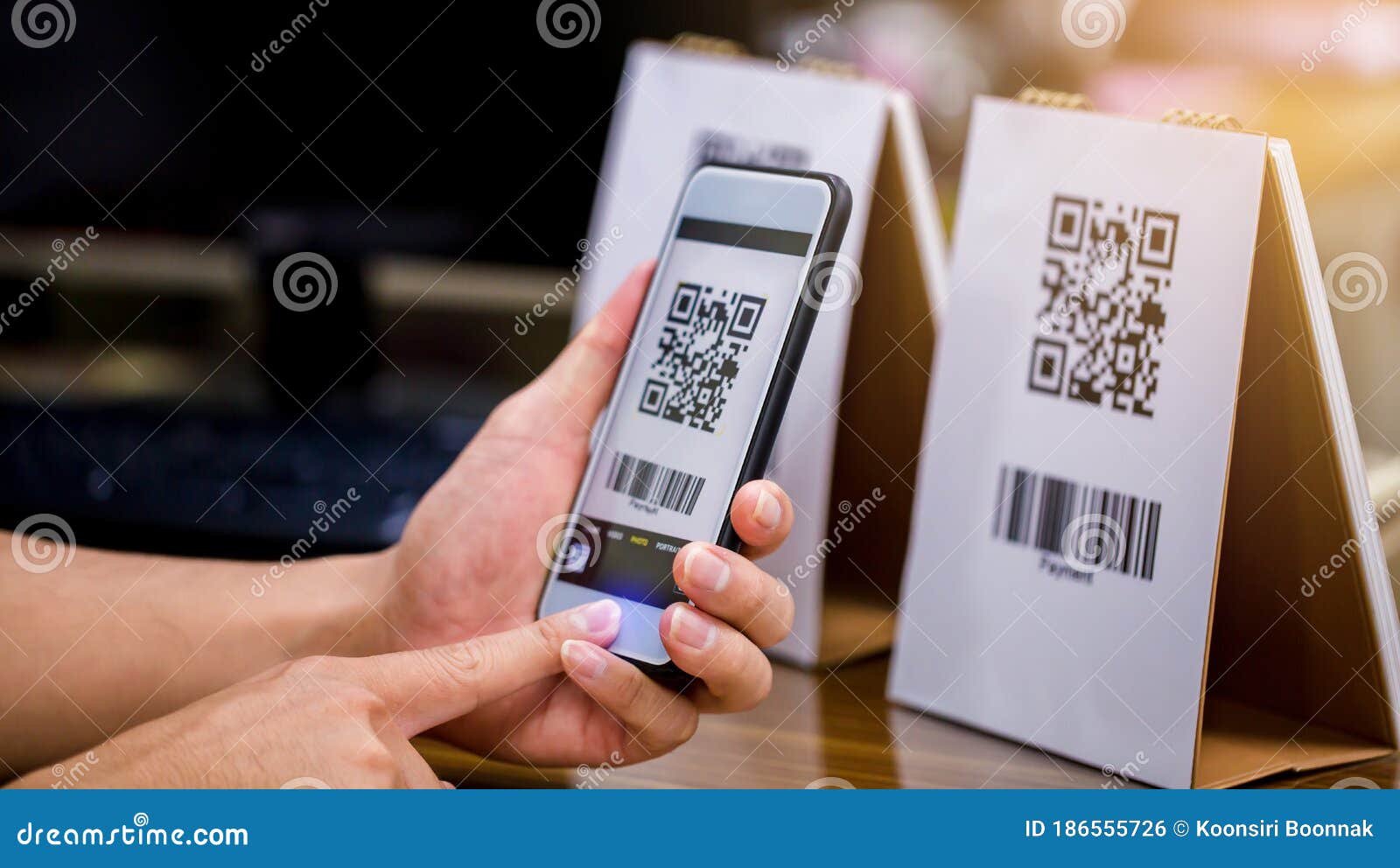 Closeup of a Hand Holding Phone and Scanning Qr Code. Man Hand Paying ...