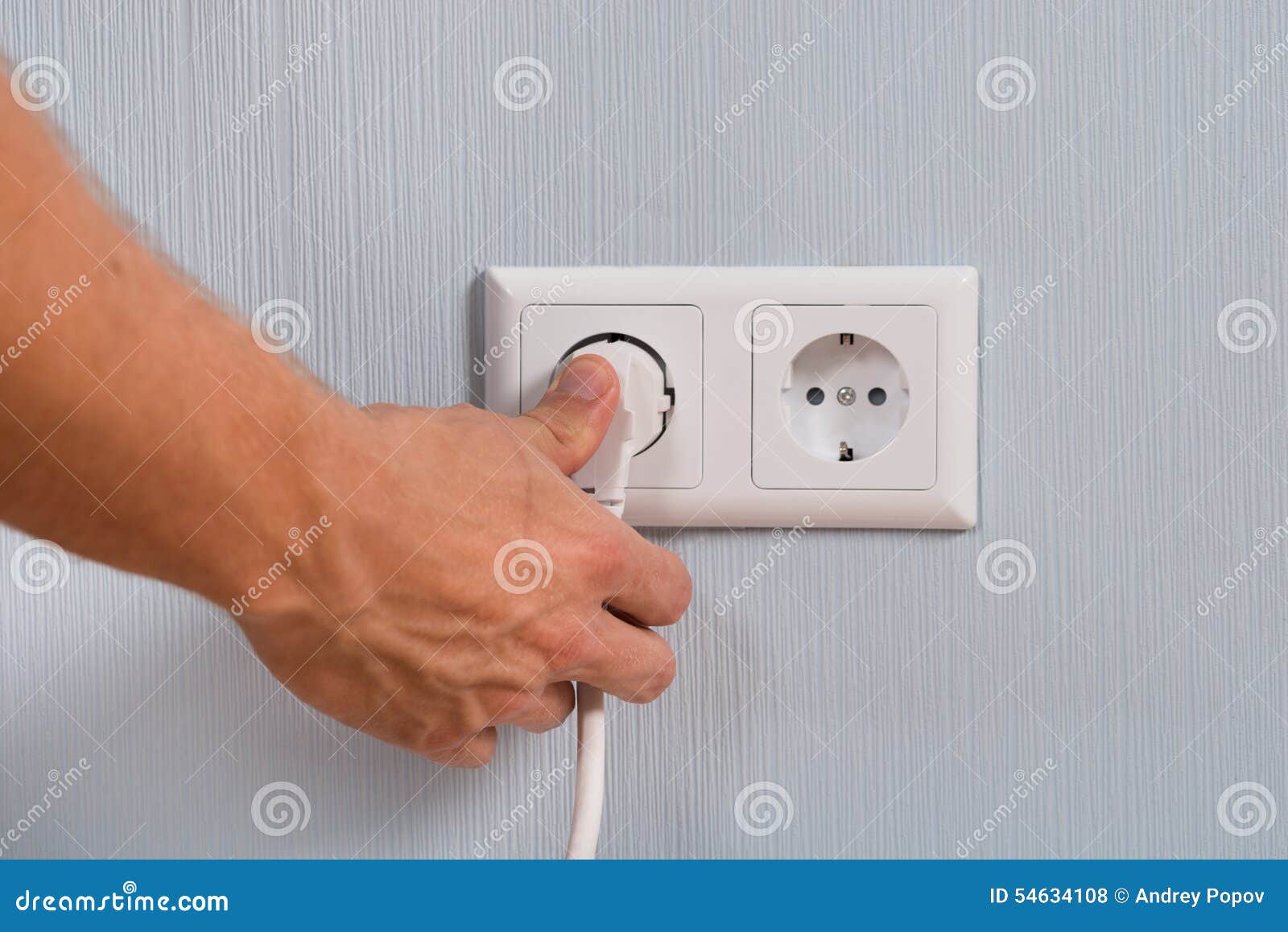 Closeup of Hand Inserting an Electrical Plug Stock Photo - Image of ...