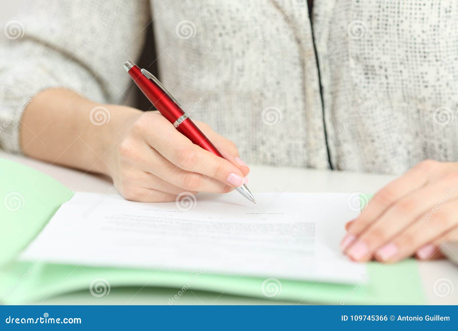 Closeup of a Hand Signing a Contract on a Desktop Stock Photo - Image ...