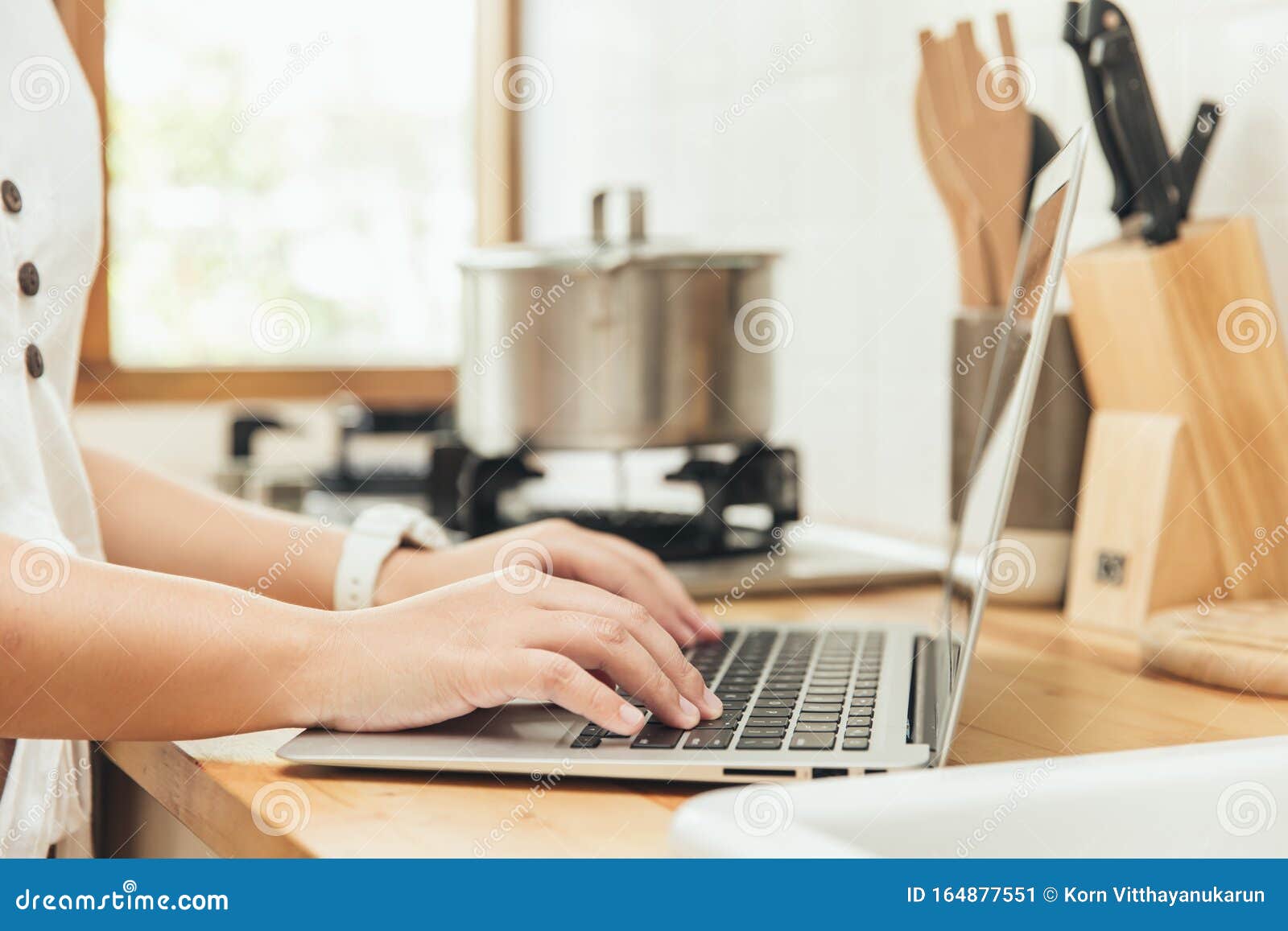 Closeup Hand Using Laptop Computer in Kitchen for Learning Cook Food or ...