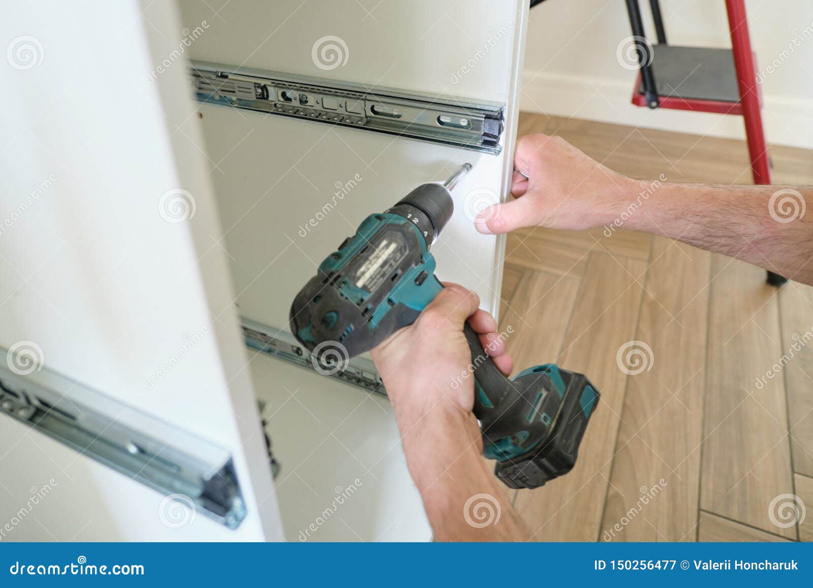 Closeup of Hand Worker Doing Furniture, Assembling Kitchen with ...