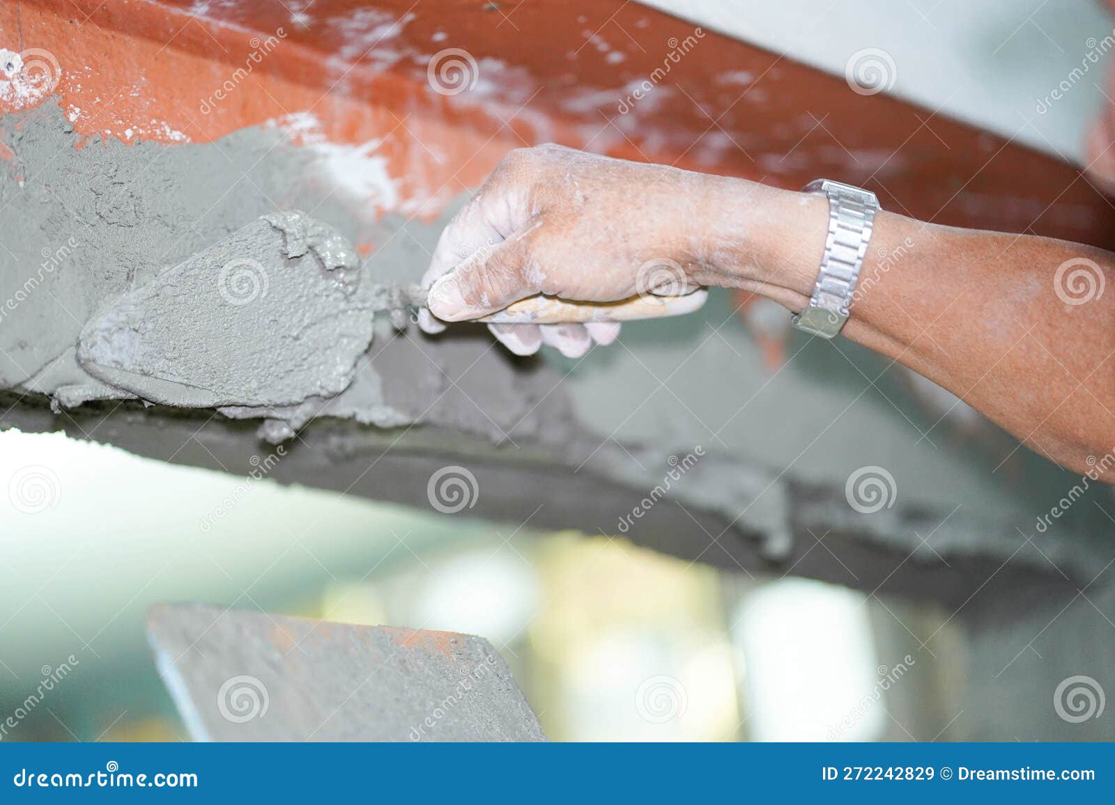 Closeup Hands of Builder Holding Mortar Pan and Plastering Walls with ...