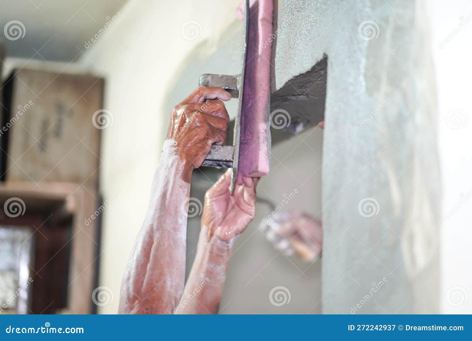 Closeup Hands of Builder Holding Mortar Pan and Sponge Plastering Walls ...