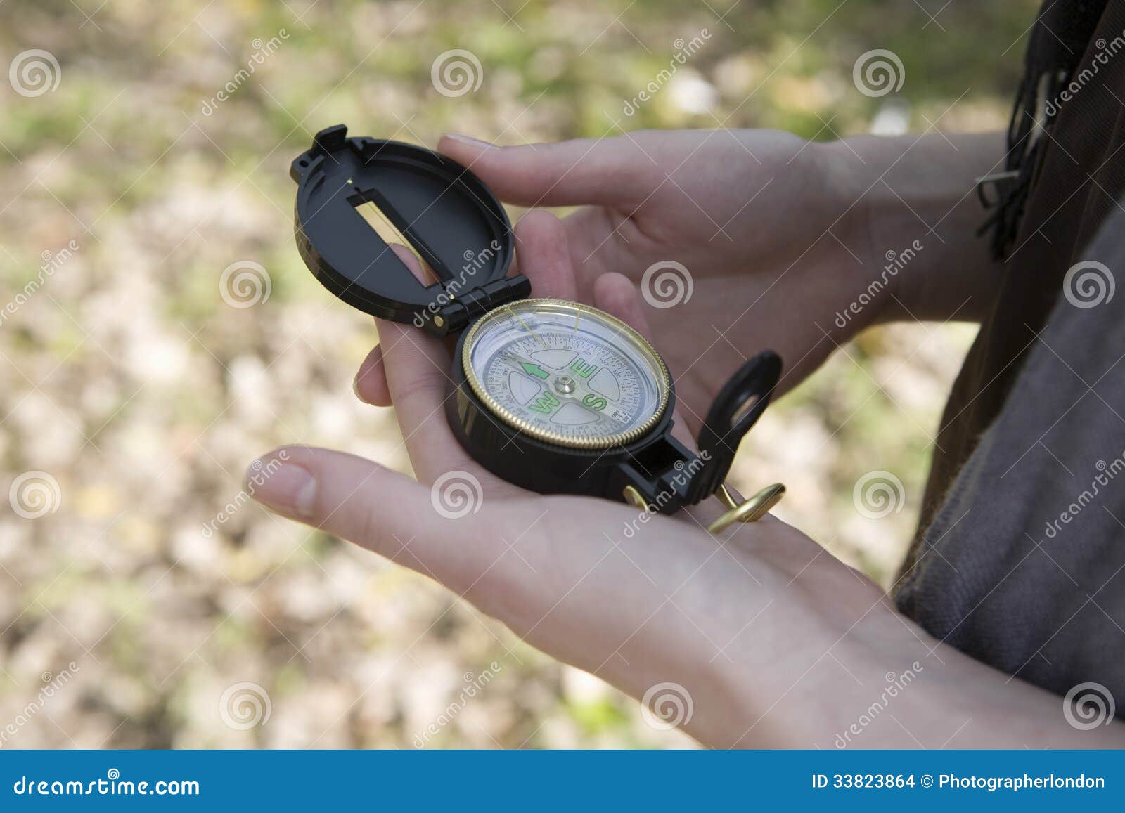 Closeup of Hands with Compass Stock Photo - Image of holding, female ...