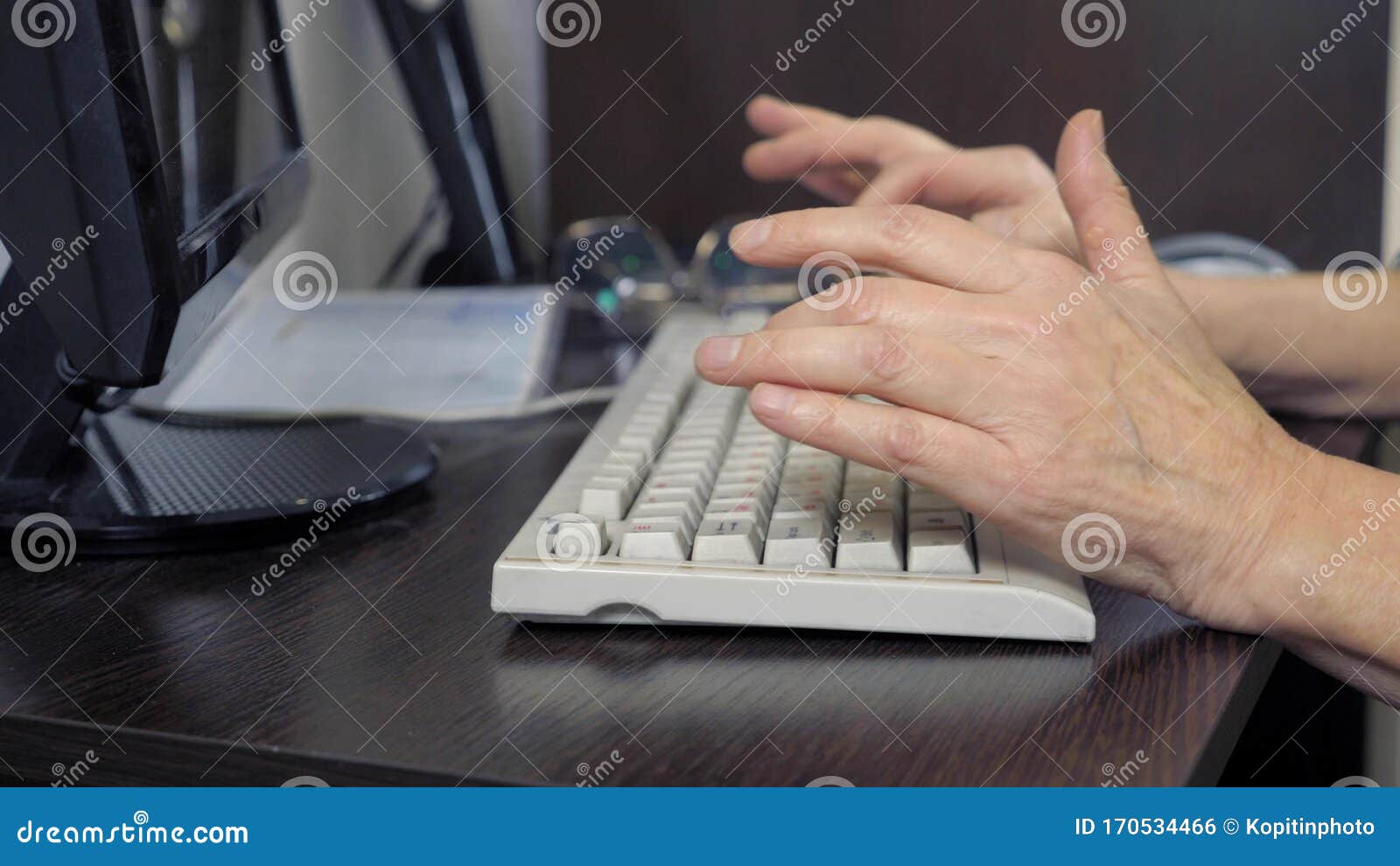 Closeup Hands of an Elderly Woman Typing on a Keyboard Stock Photo ...