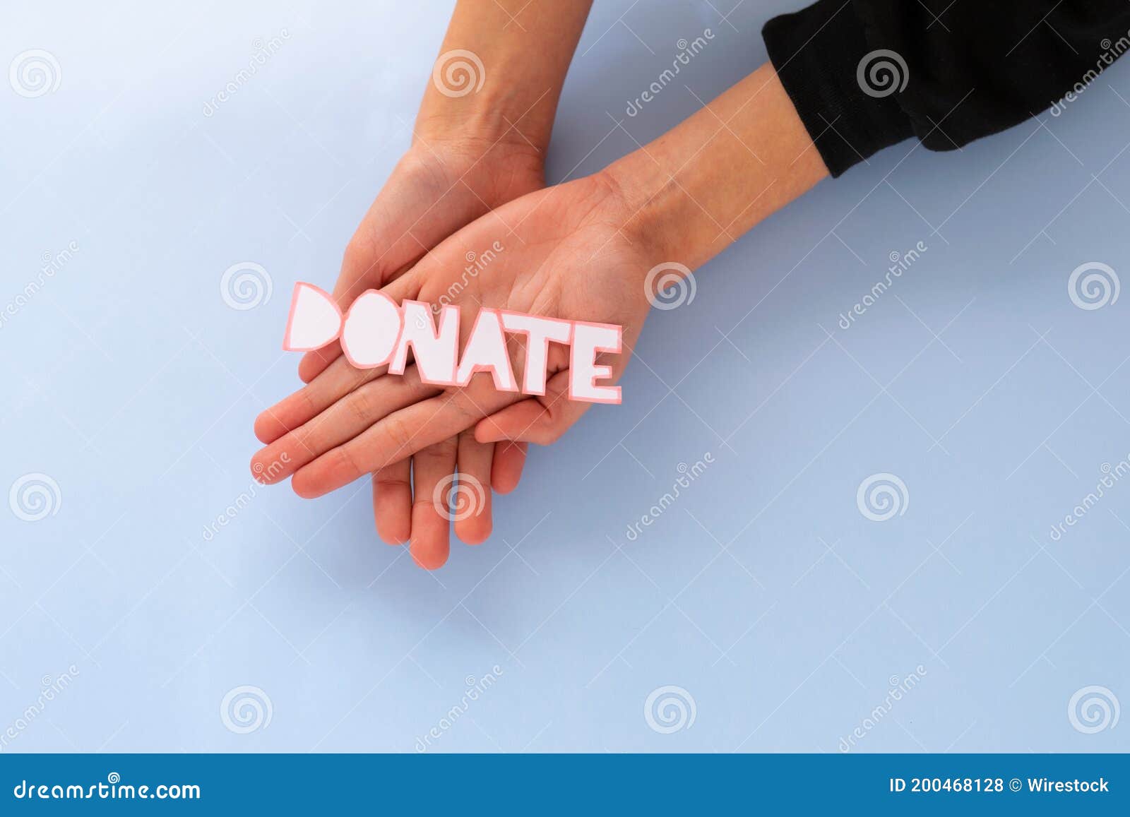 Closeup of Hands Holding a Sign, Motivation for Donating Stock Photo ...