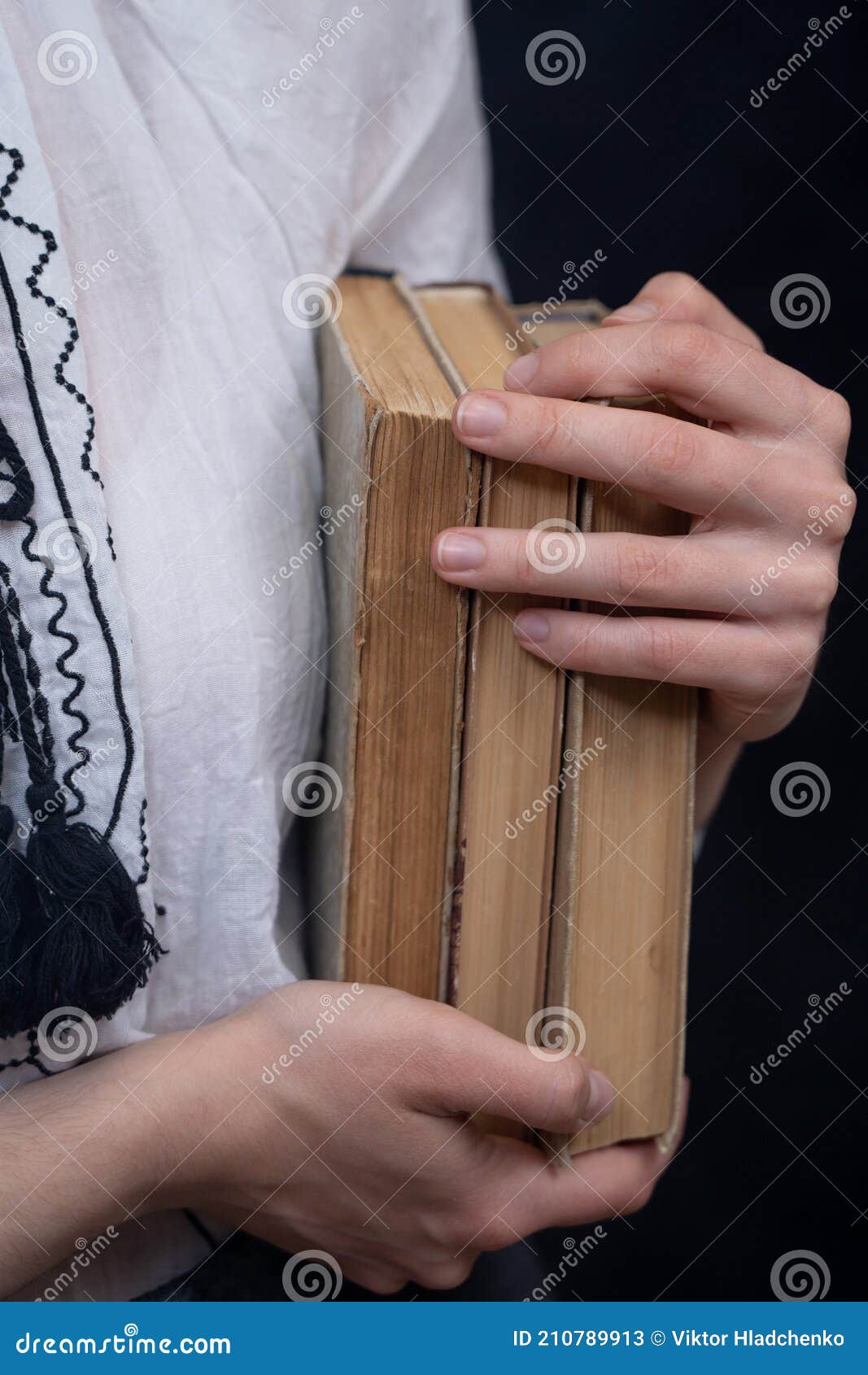 Closeup of Hands Holding a Stack of Books. Concept of Self-education ...